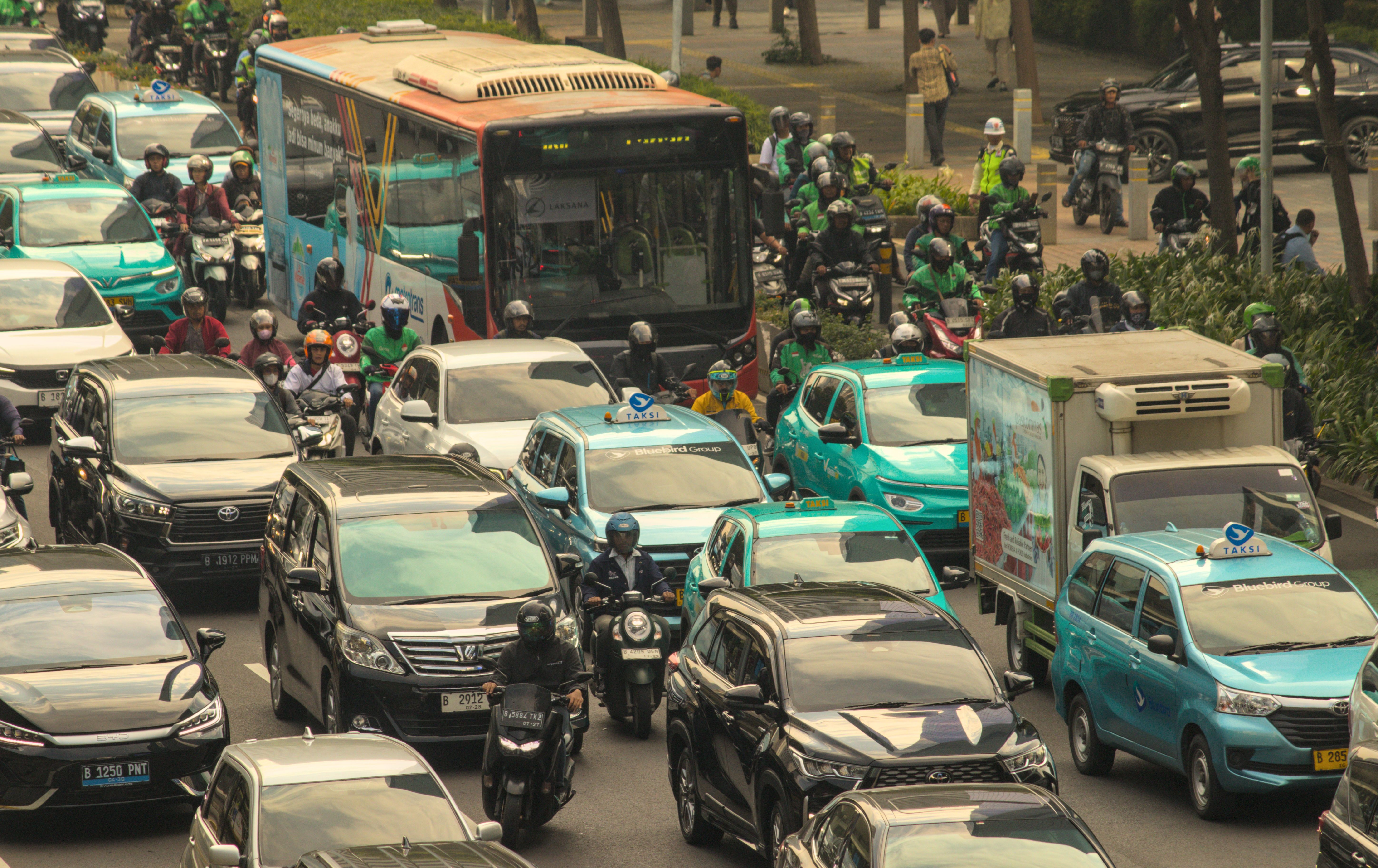 Urban Traffic Congestion with Motorbikes and Cars · Free Stock Photo