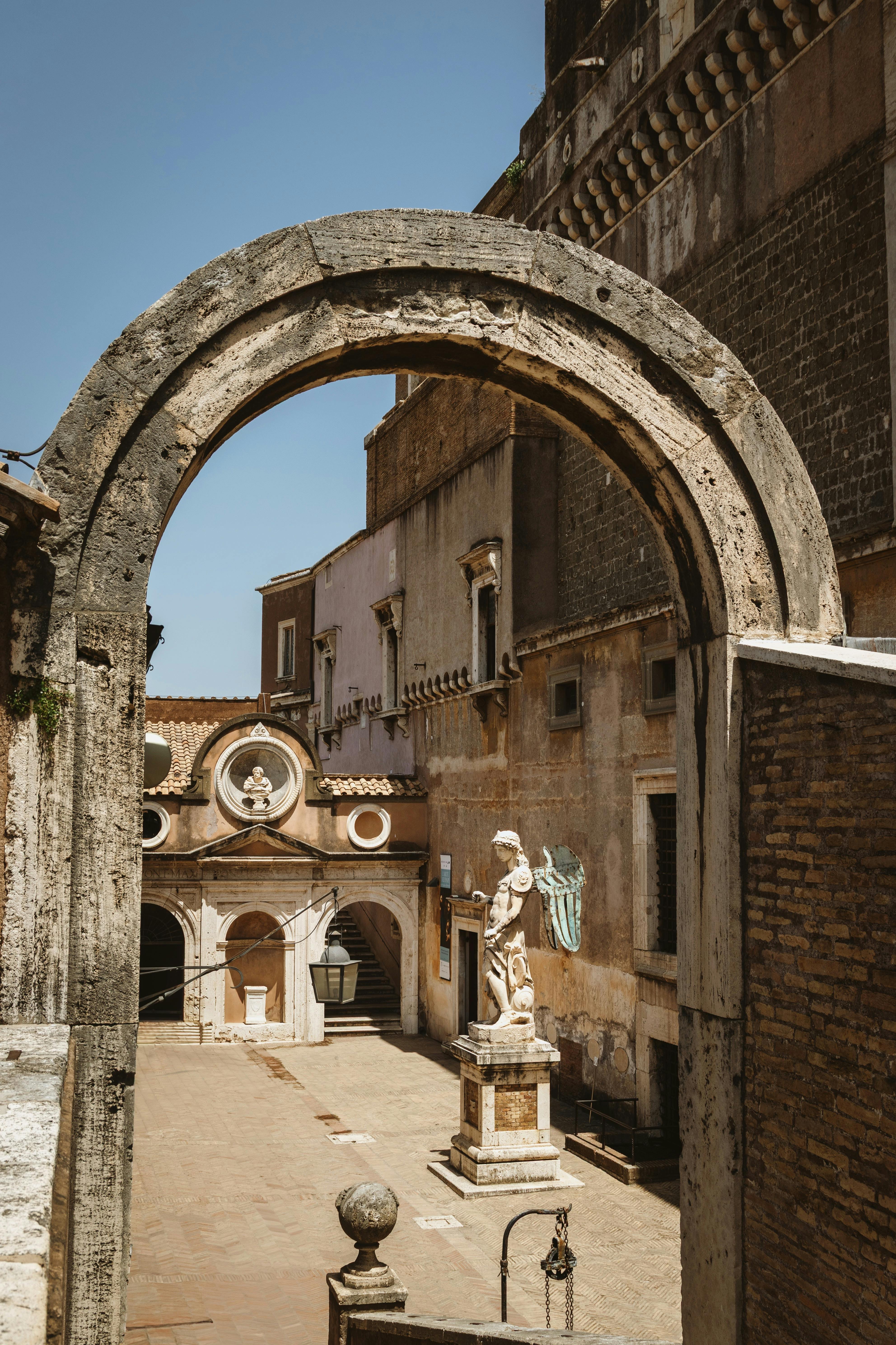 Historic Courtyard Arch in Rome, Italy · Free Stock Photo