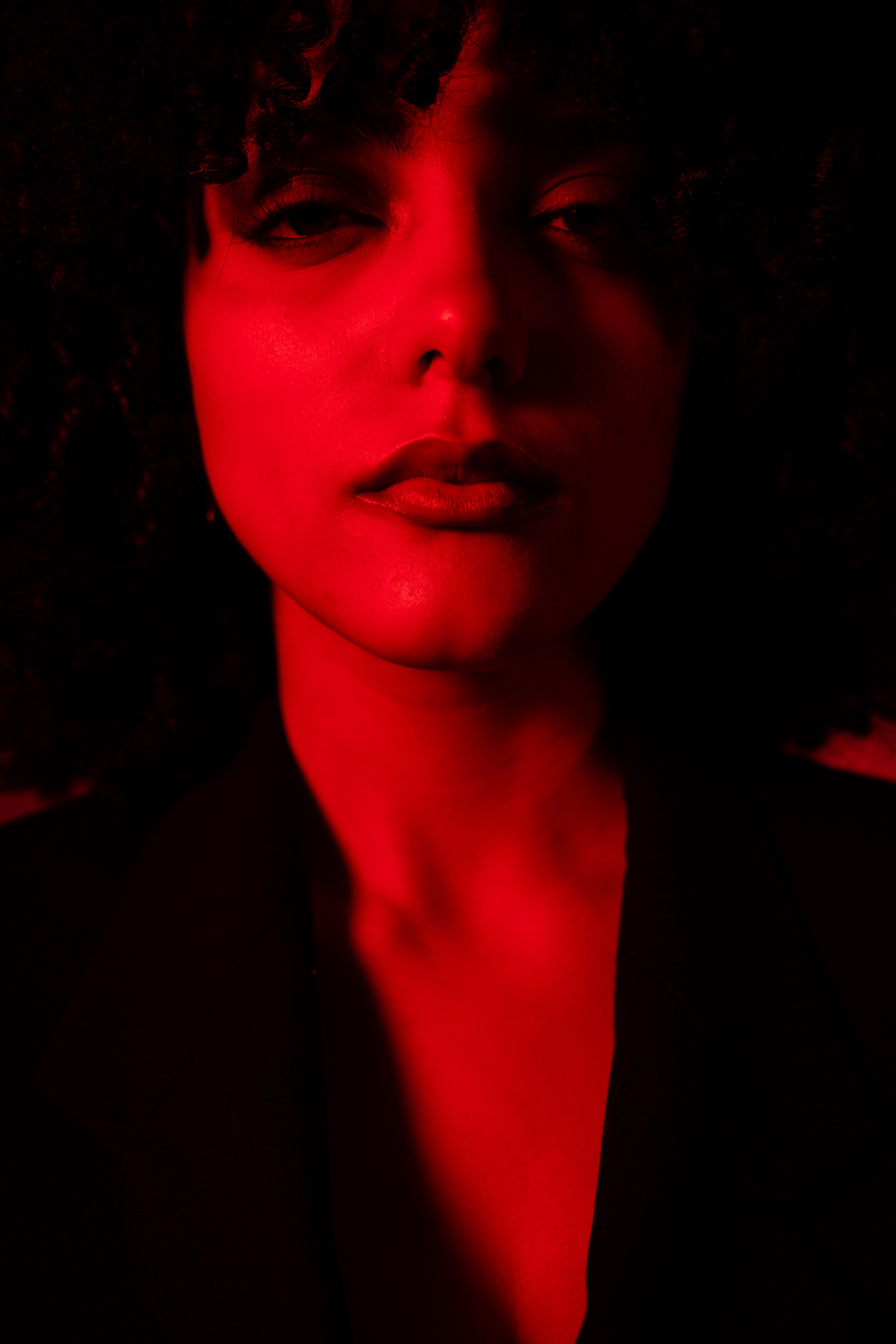 Dramatic Red-Hued Artistic Portrait in London · Free Stock Photo