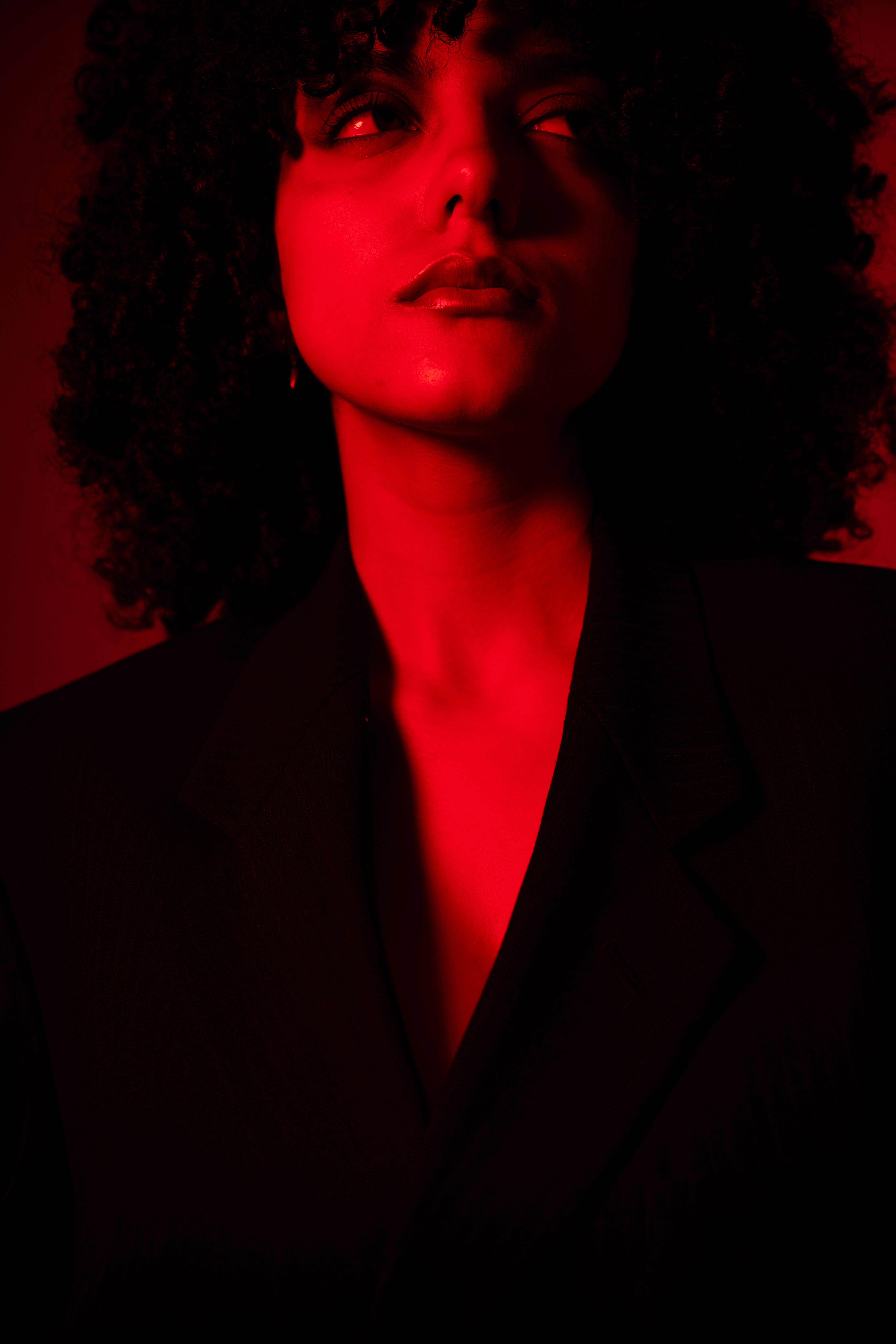 Red-Toned Fashion Portrait of a Woman in London · Free Stock Photo