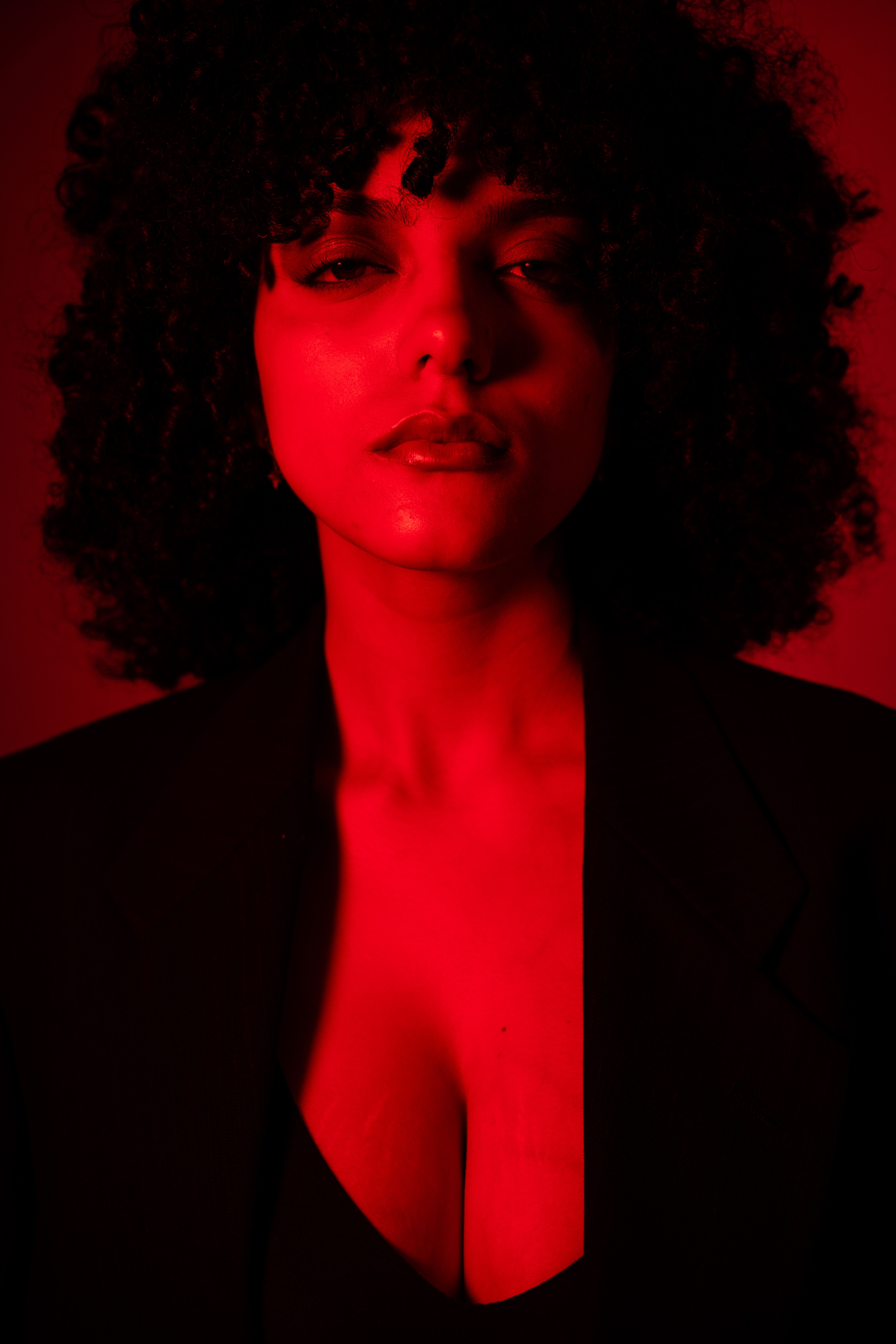 Dramatic Red-Hued Portrait of a Woman · Free Stock Photo