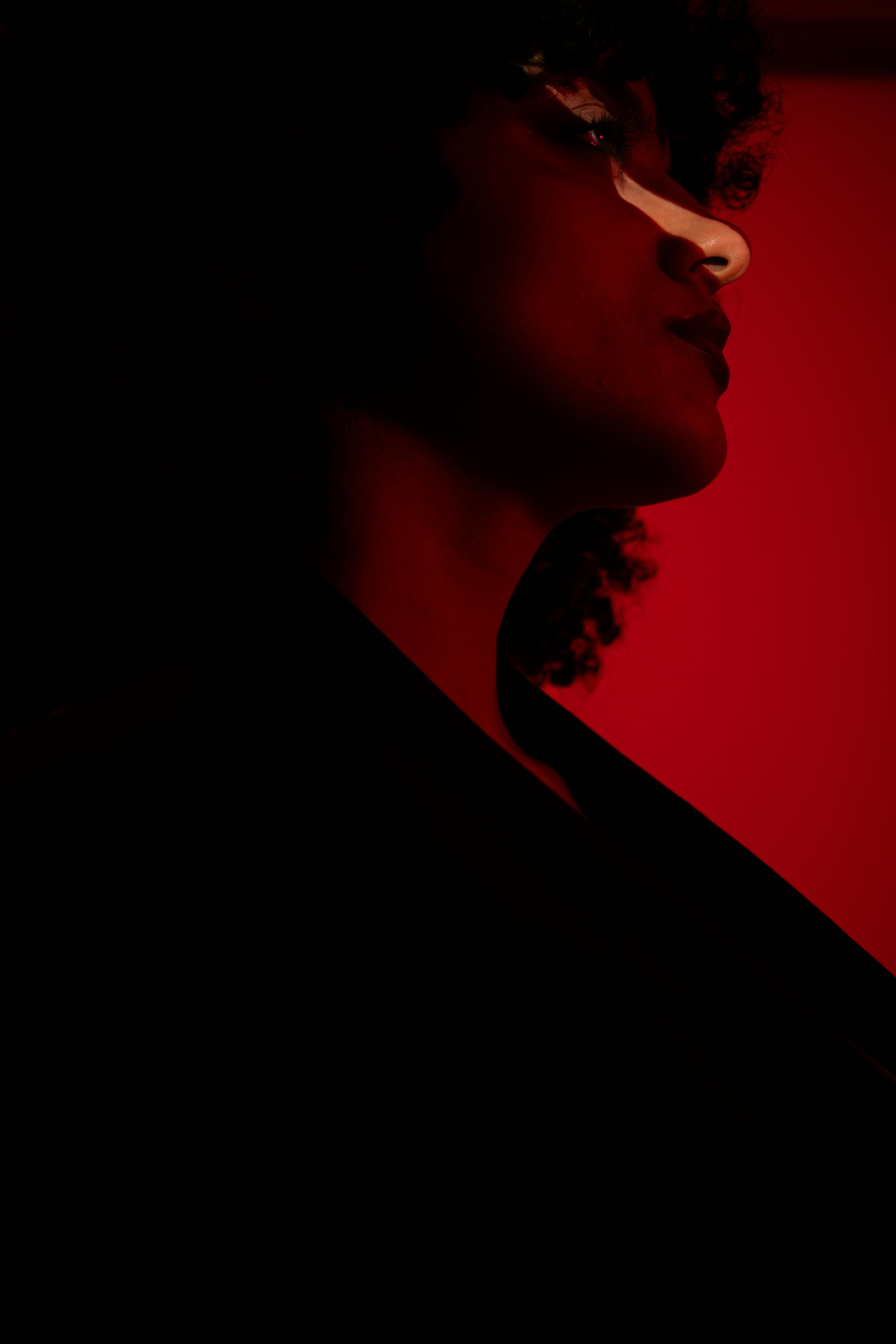 Cinematic Portrait with Dramatic Red Lighting · Free Stock Photo