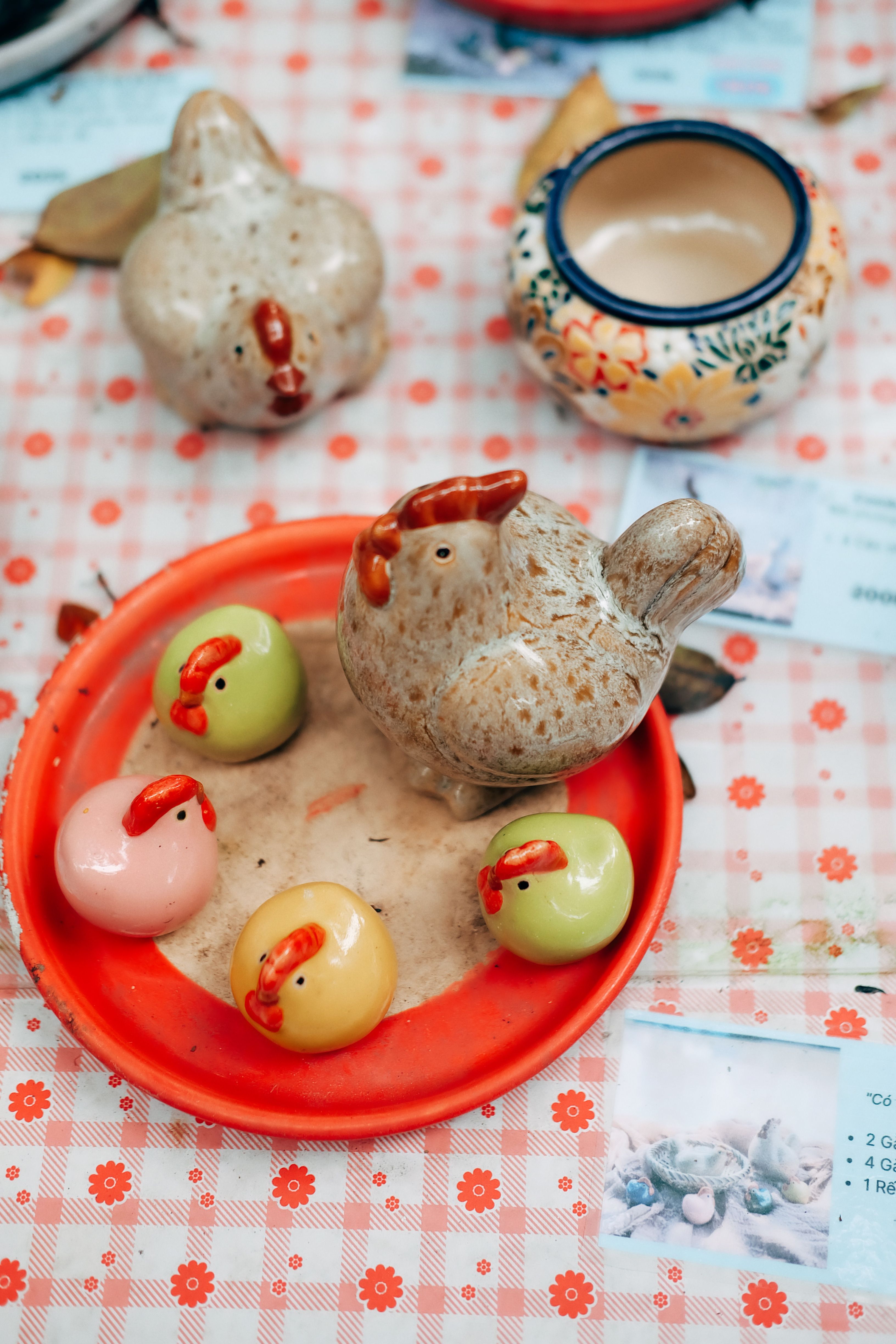 Colorful Ceramic Hen and Chicks on Decorative Plate · Free Stock Photo