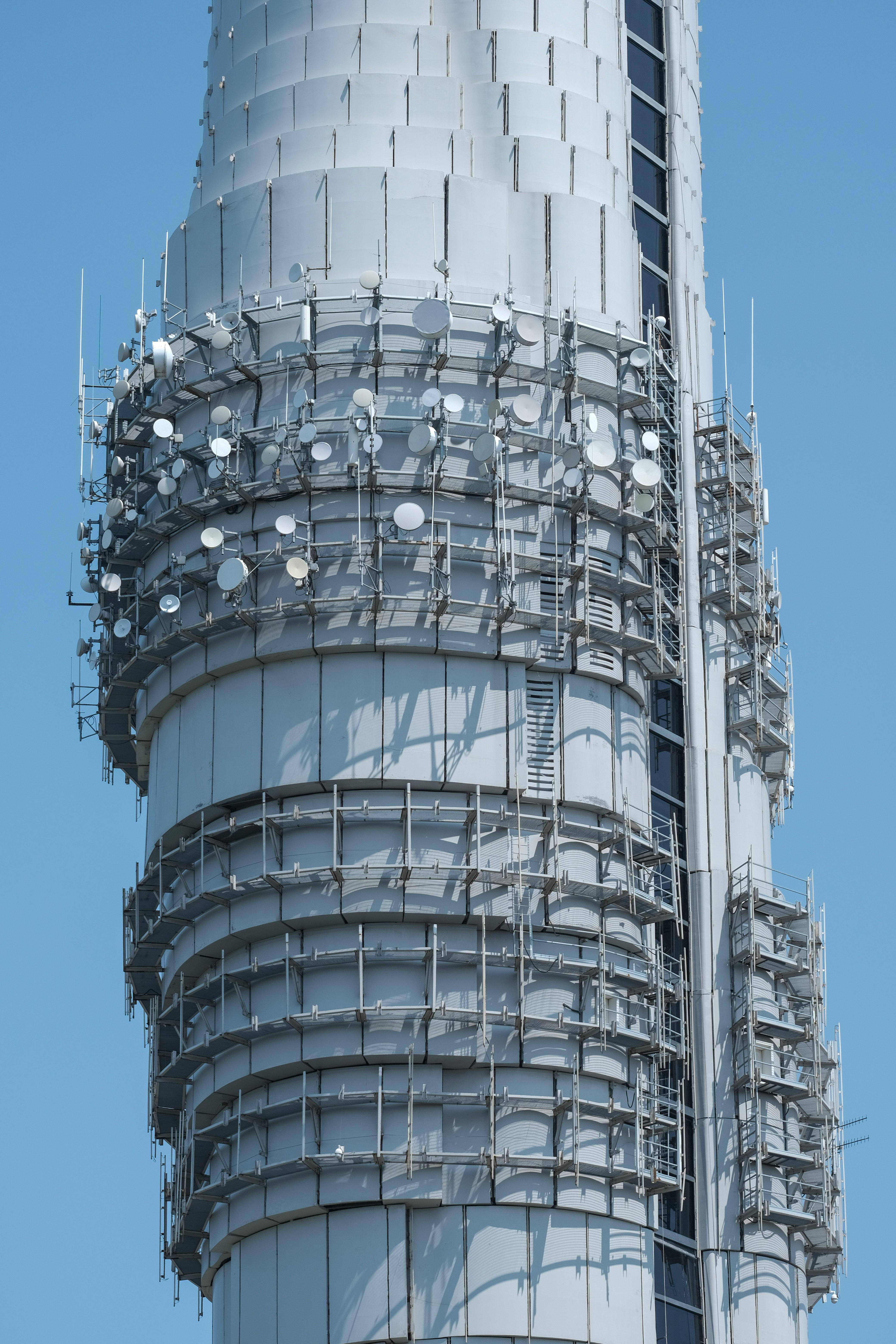Tall Communications Tower against Blue Sky · Free Stock Photo