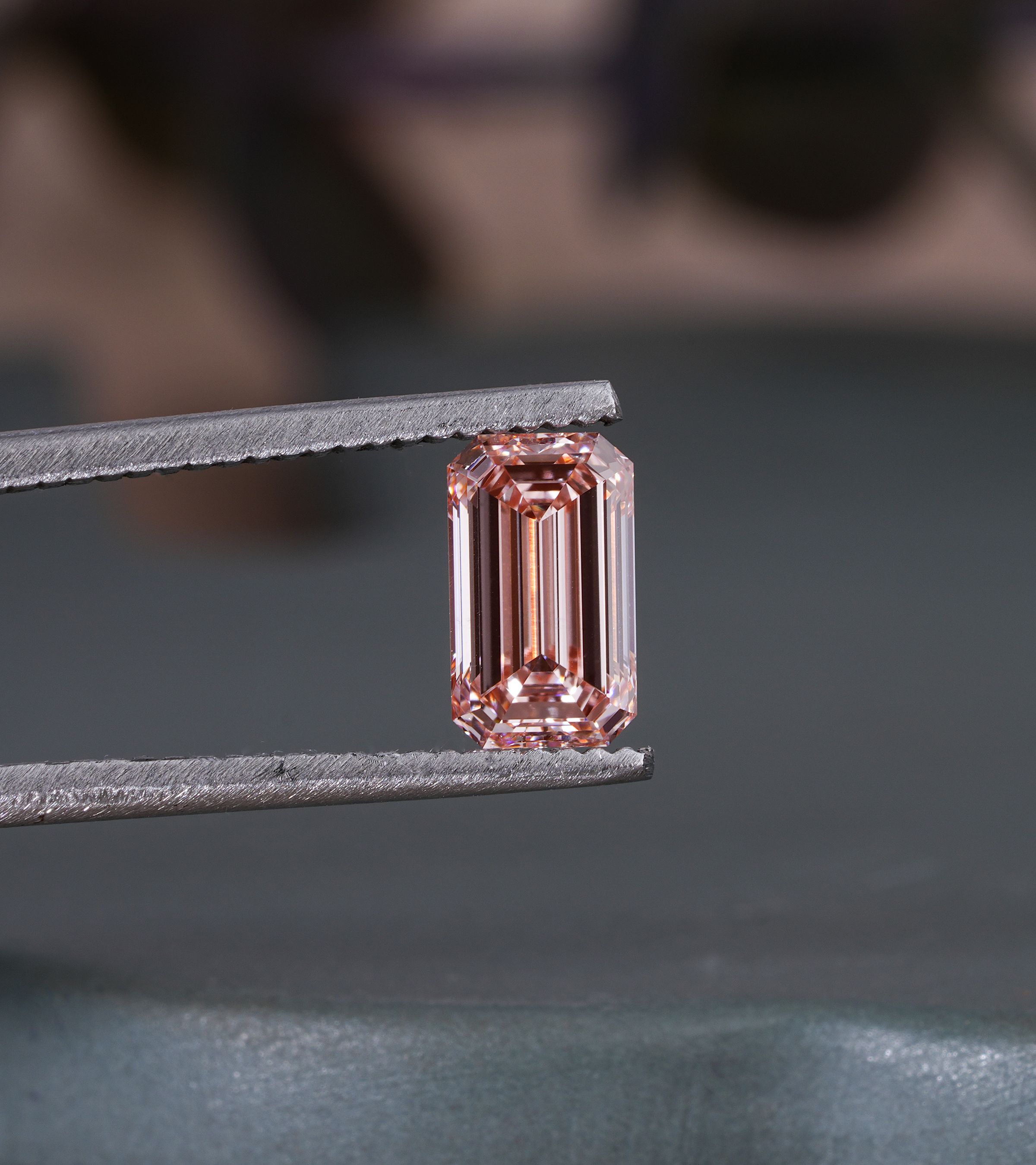 Elegant Pink Emerald Cut Diamond Closeup · Free Stock Photo