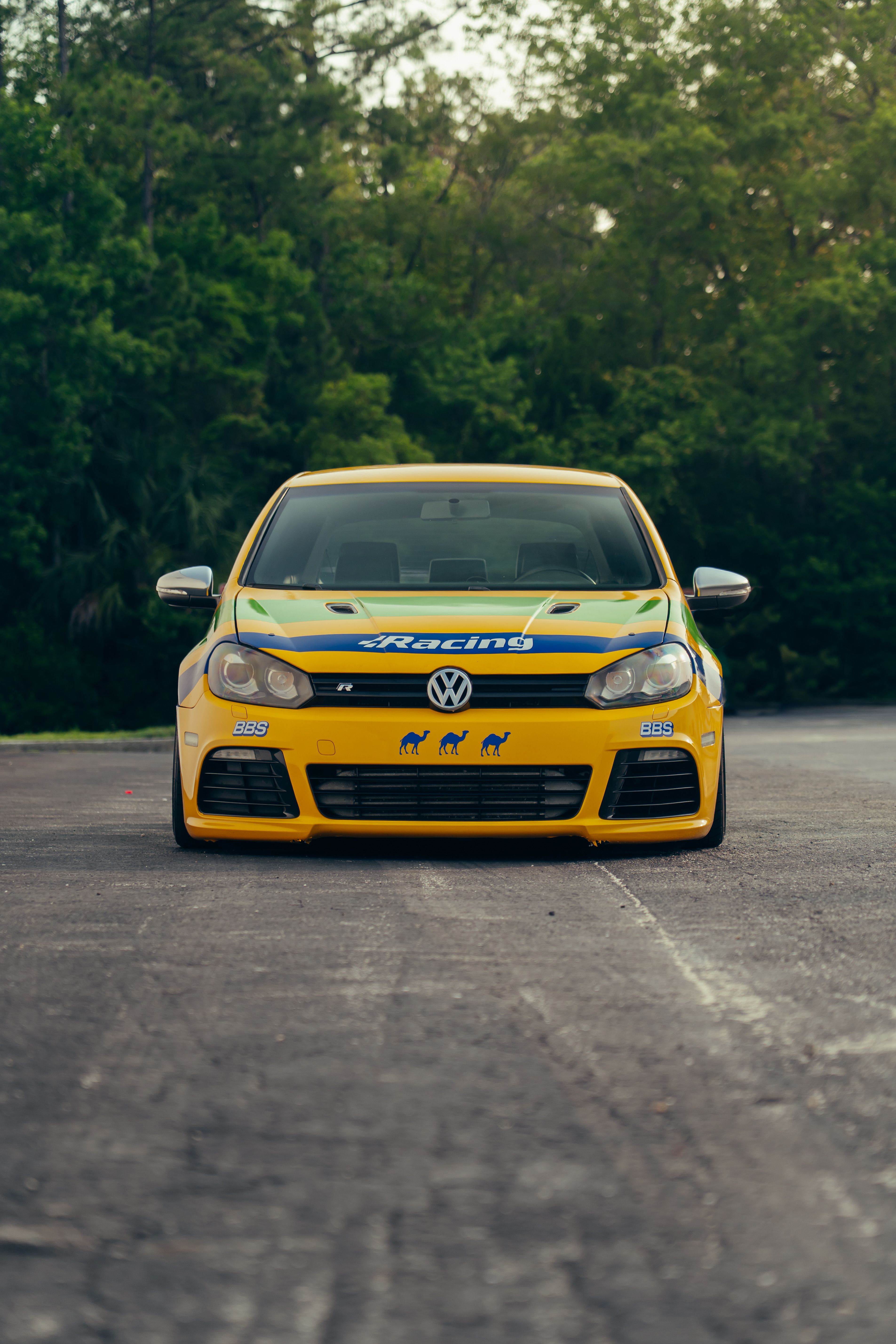 Yellow Racing Car Parked on Asphalt Road · Free Stock Photo
