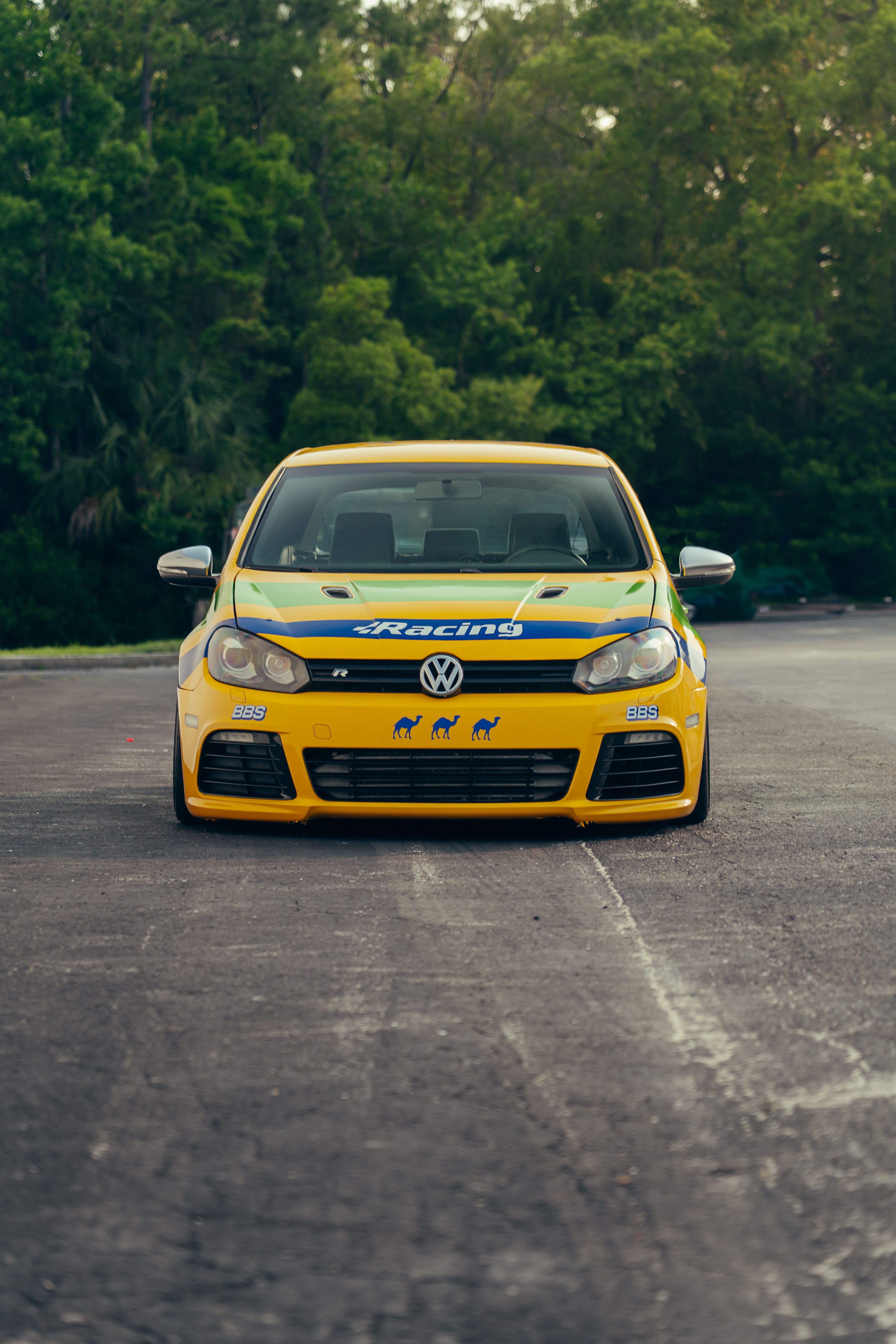 Yellow Racing Car on Open Road Outdoors · Free Stock Photo