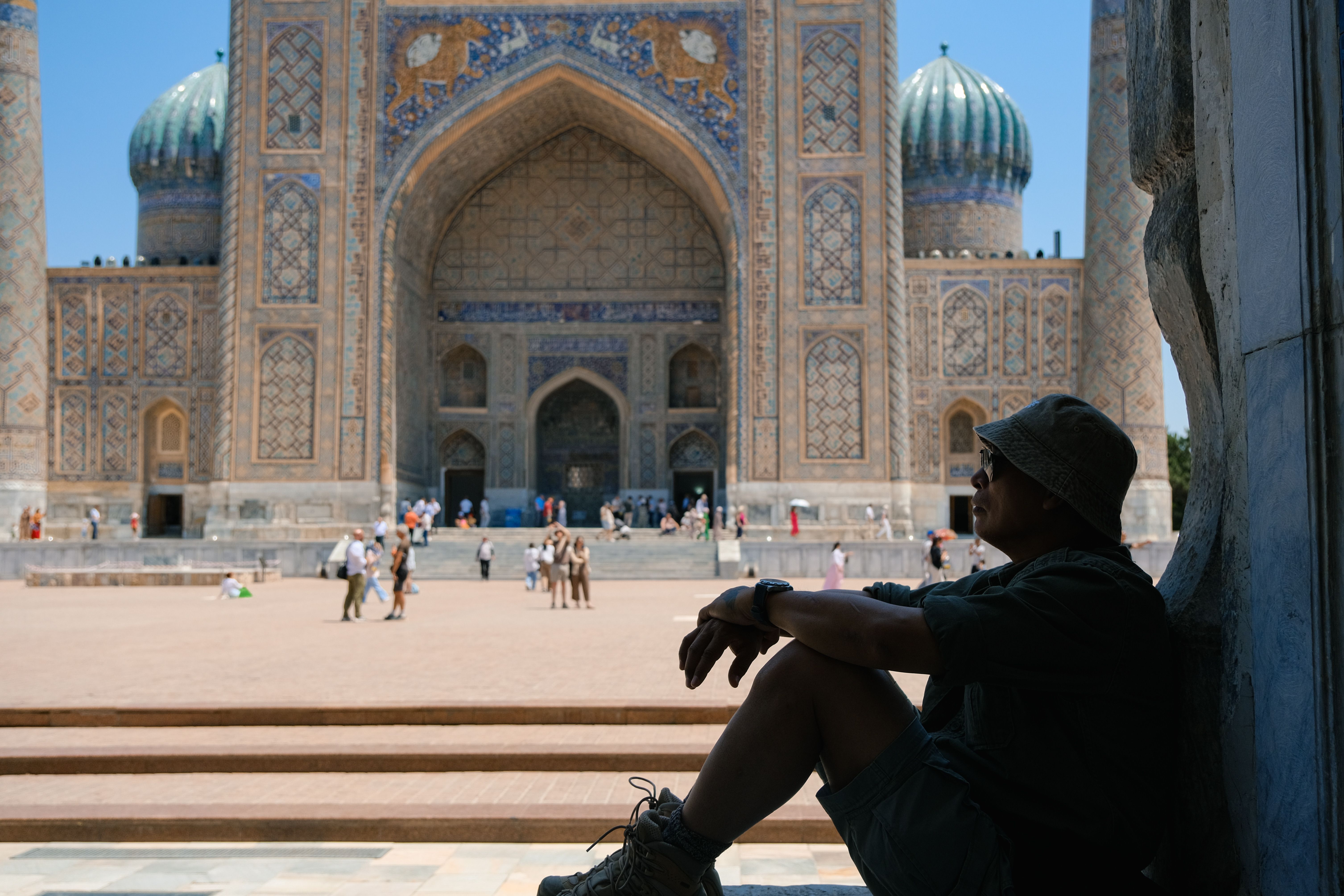 Traveler Relaxing at Historic Samarkand Landmark · Free Stock Photo