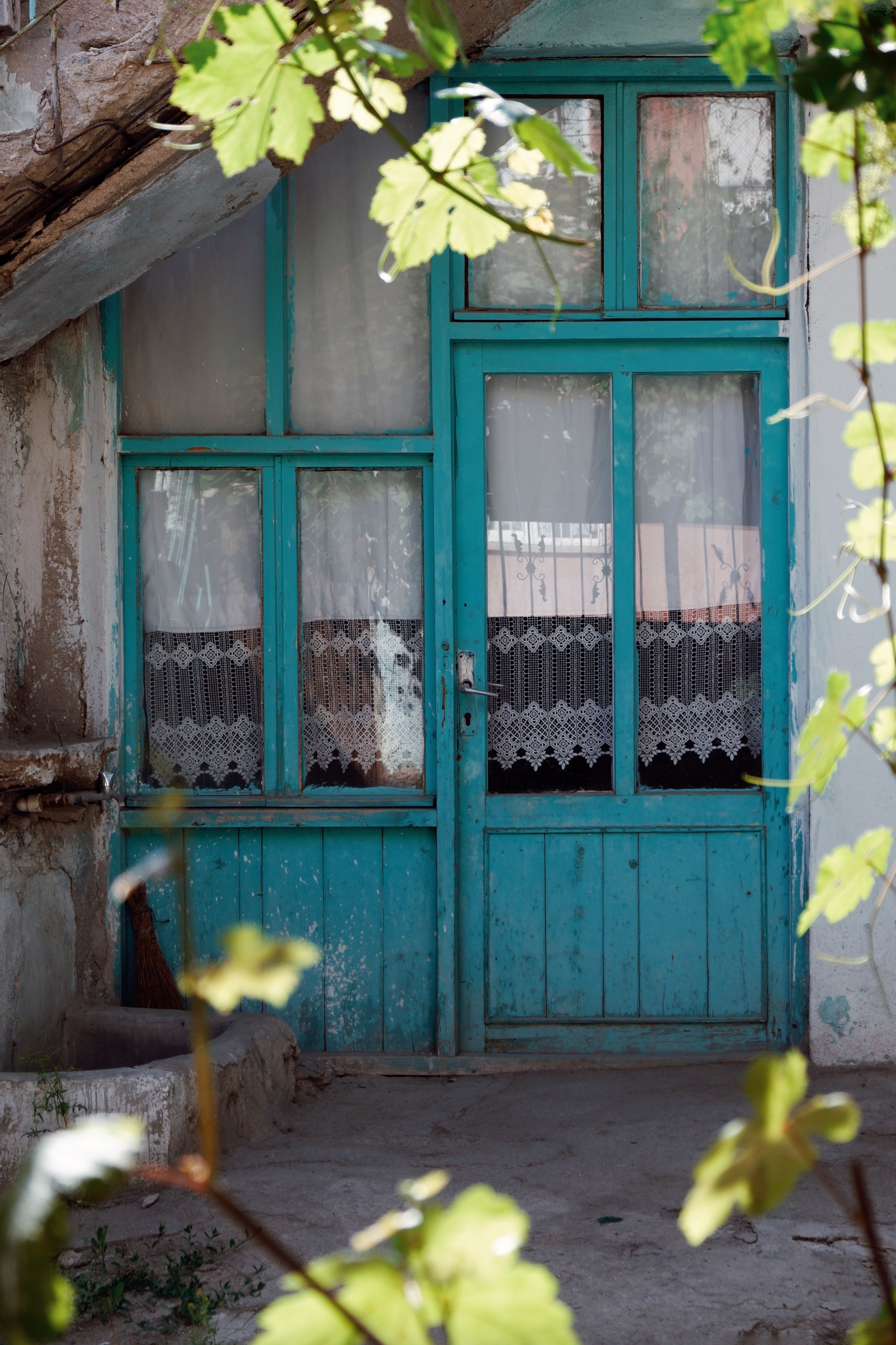 Rustic Weathered Blue Door with Lace Curtains · Free Stock Photo