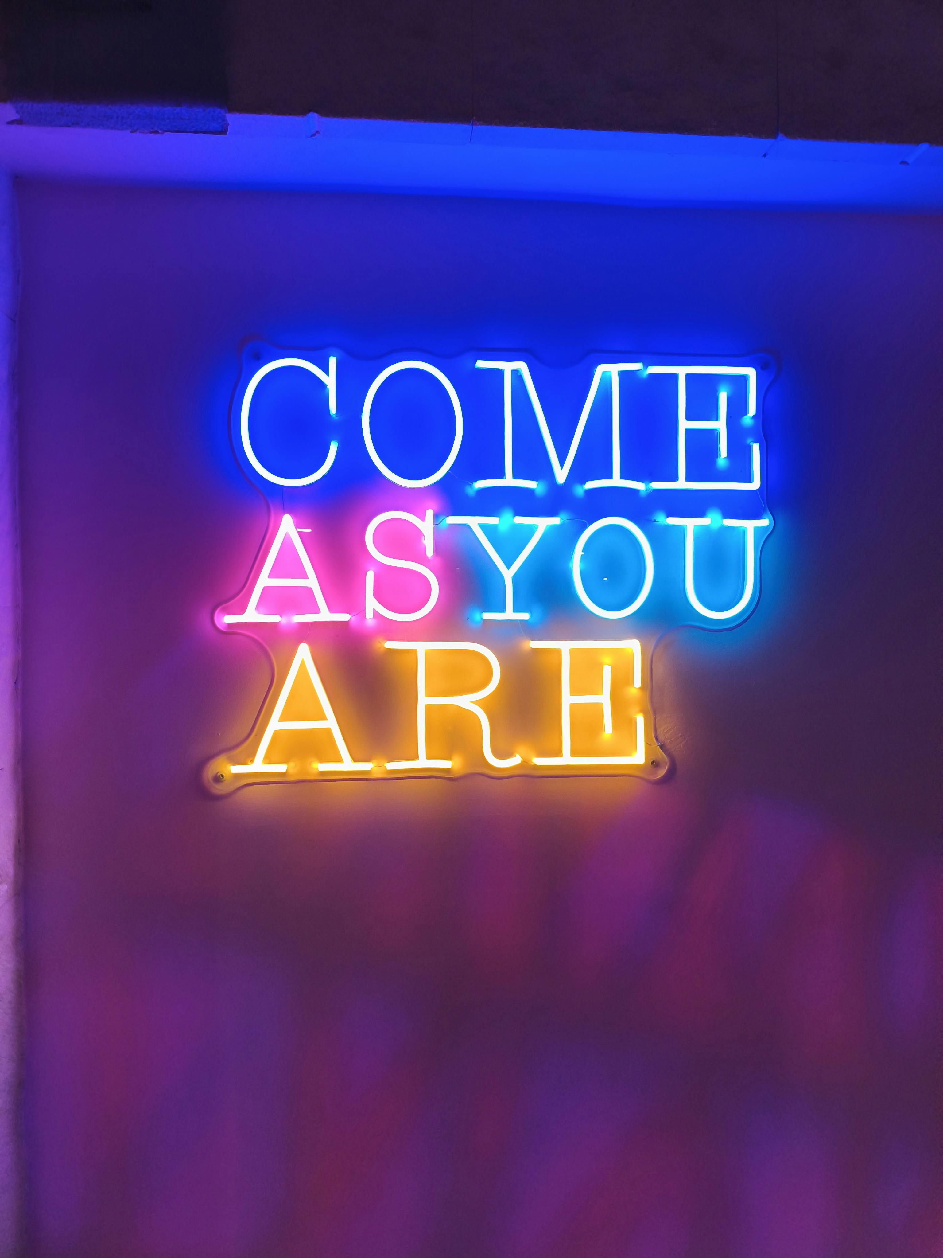Vibrant Neon Sign with Inspirational Message · Free Stock Photo