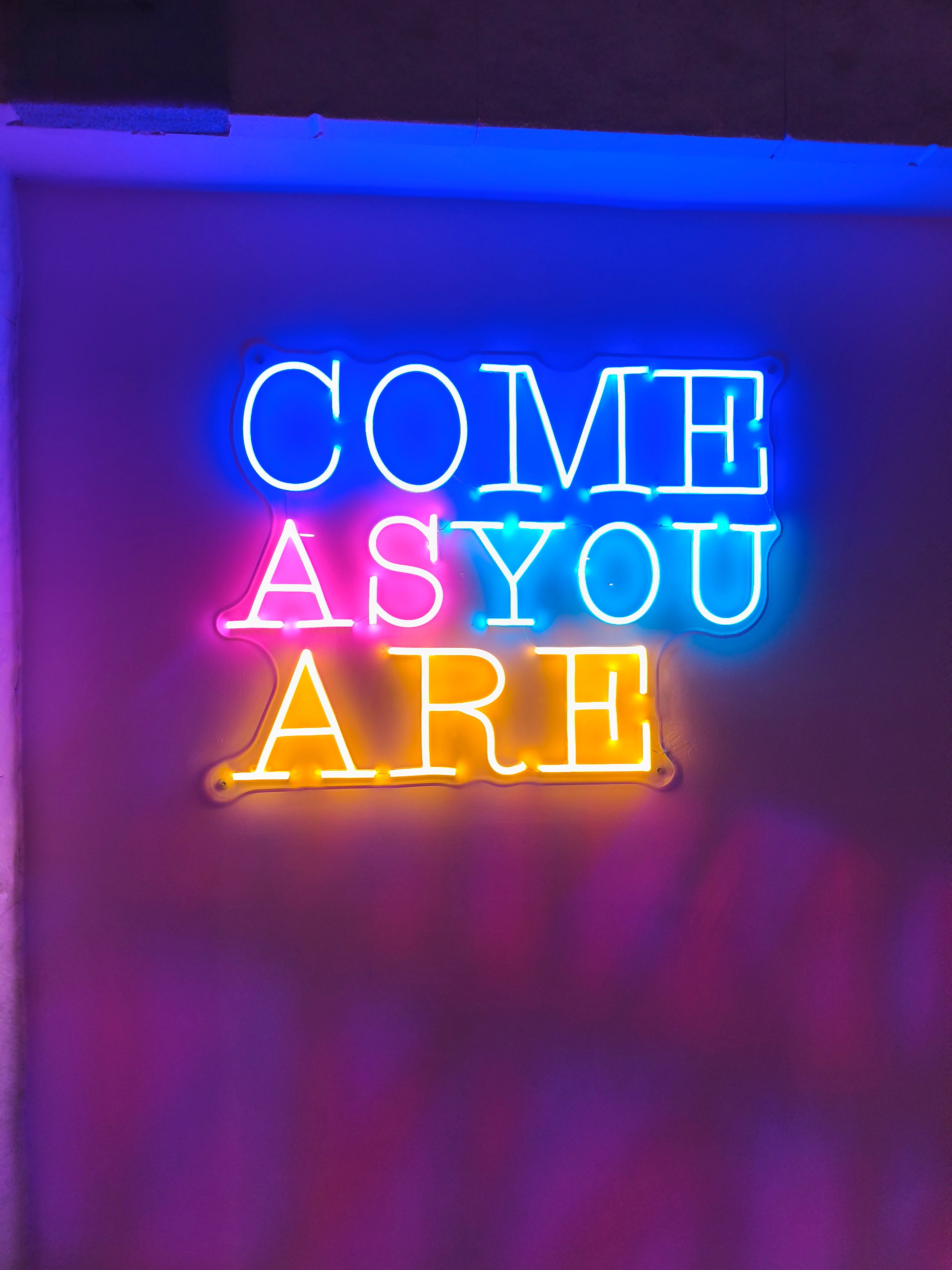 Vibrant Neon Sign with Inspirational Message · Free Stock Photo
