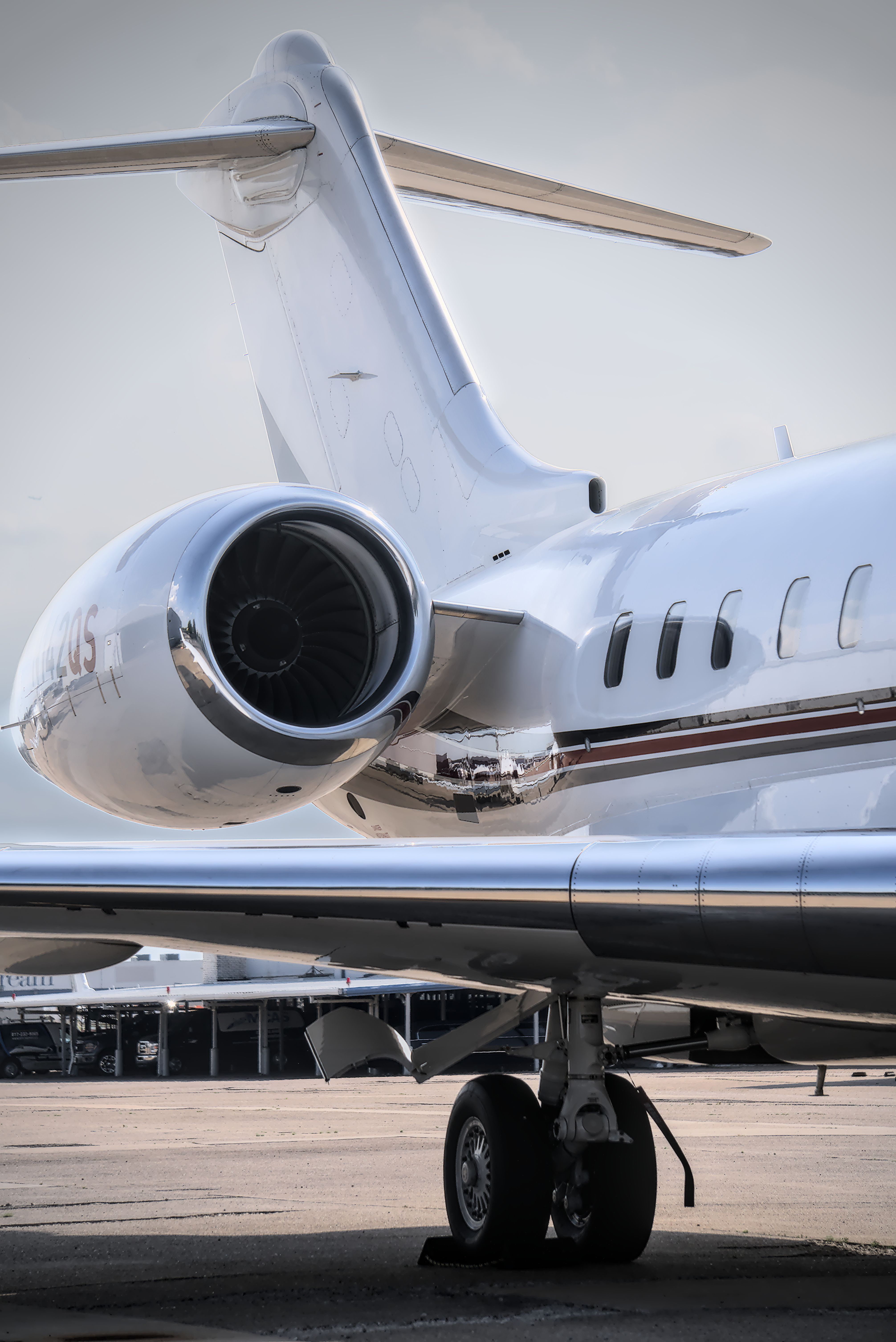 Sleek Private Jet Parked at Airport Tarmac · Free Stock Photo