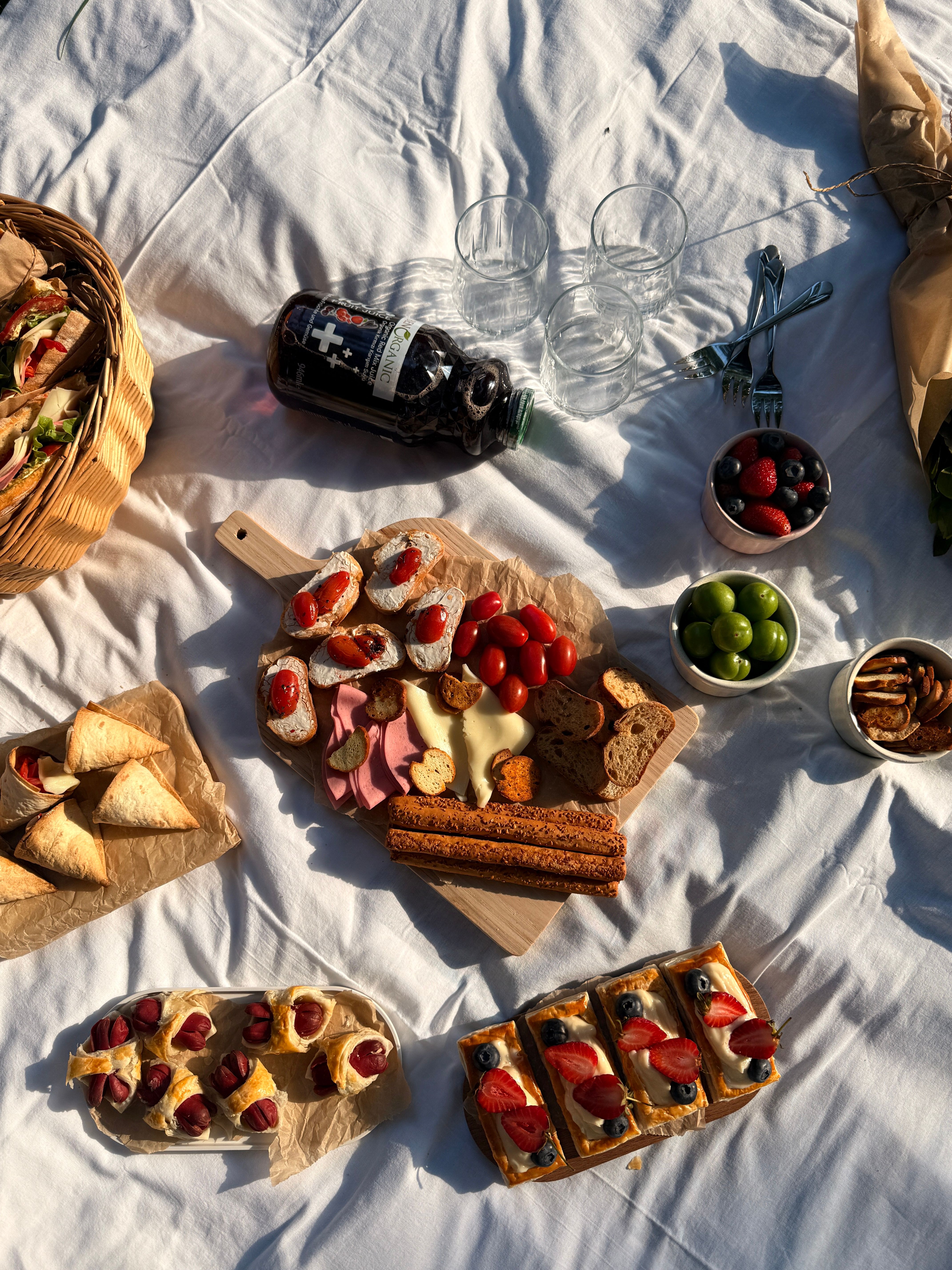 Gourmet Picnic Setup with Wine and Snacks · Free Stock Photo