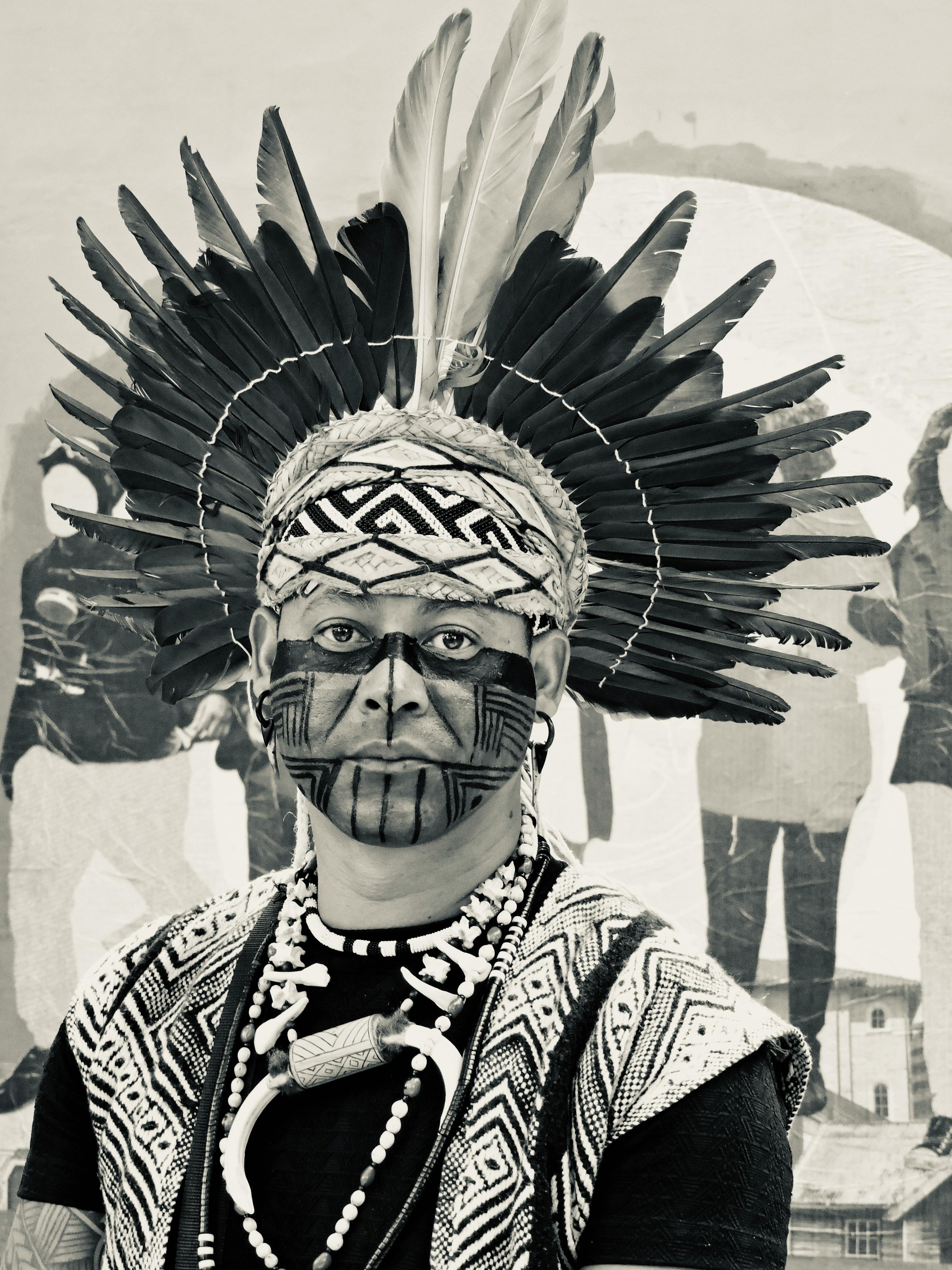 Traditional Tribal Attire with Feathered Headdress · Free Stock Photo