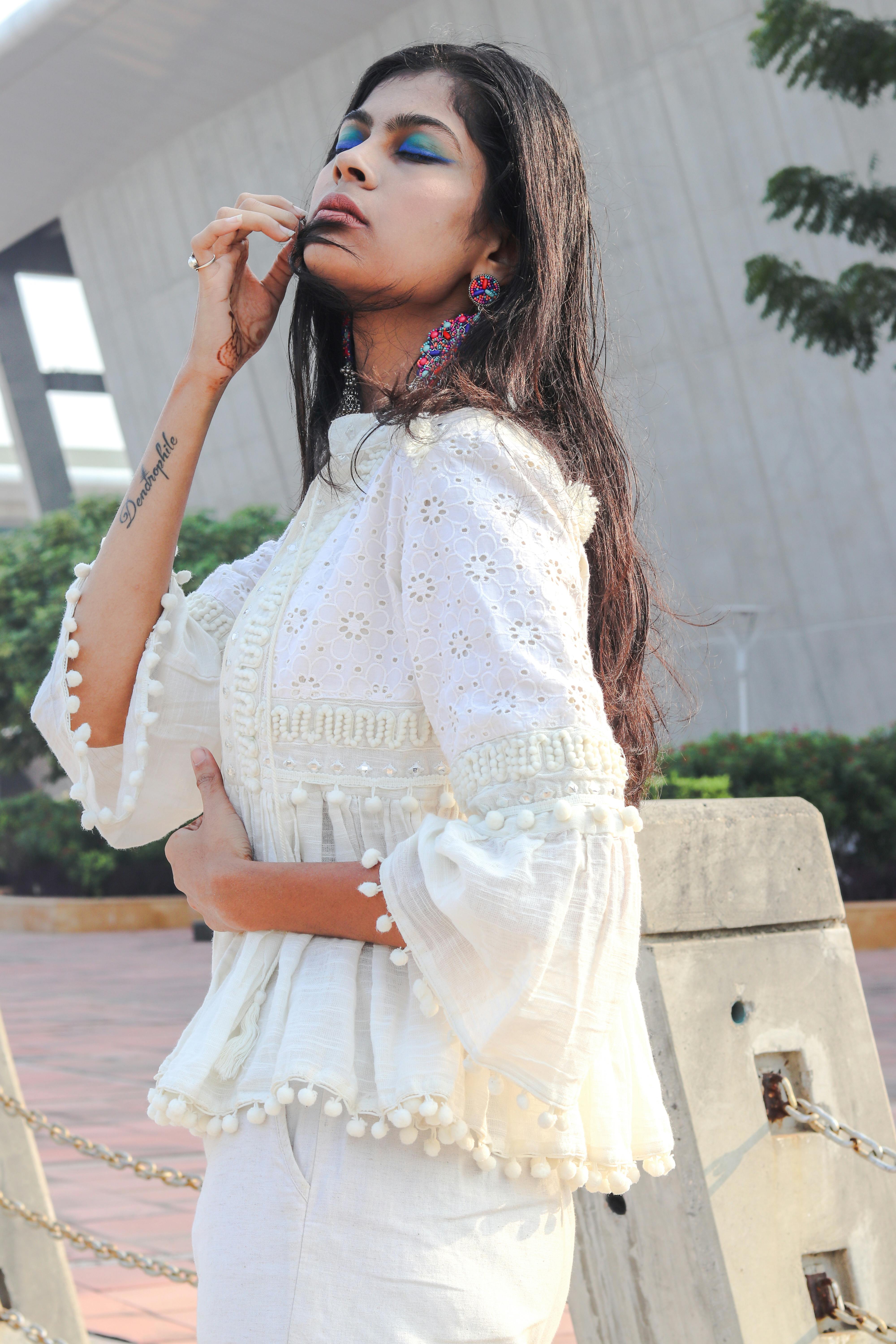 Photo Of Woman Wearing White Top · Free Stock Photo
