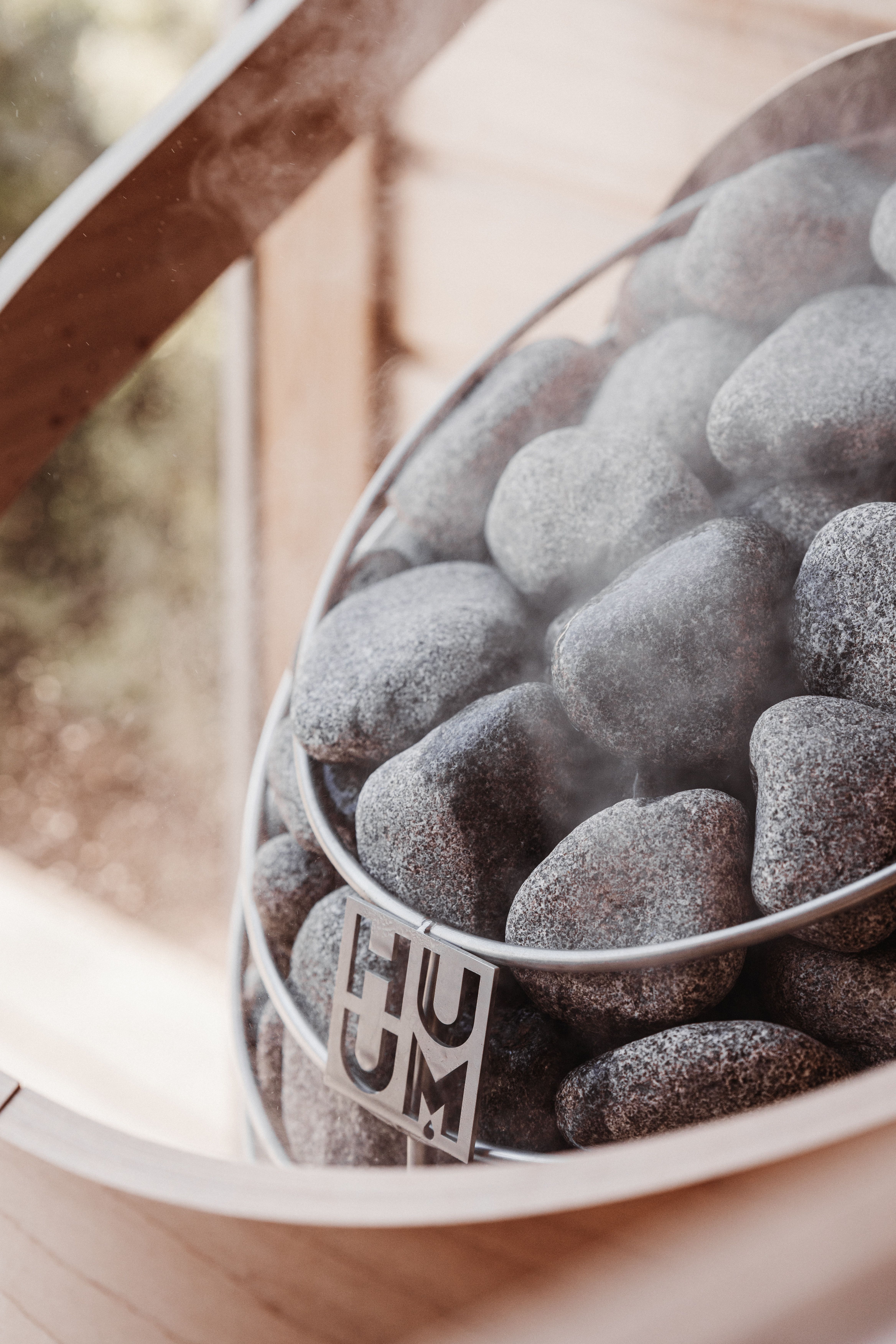 Modern Sauna Heater with Steaming Stones · Free Stock Photo