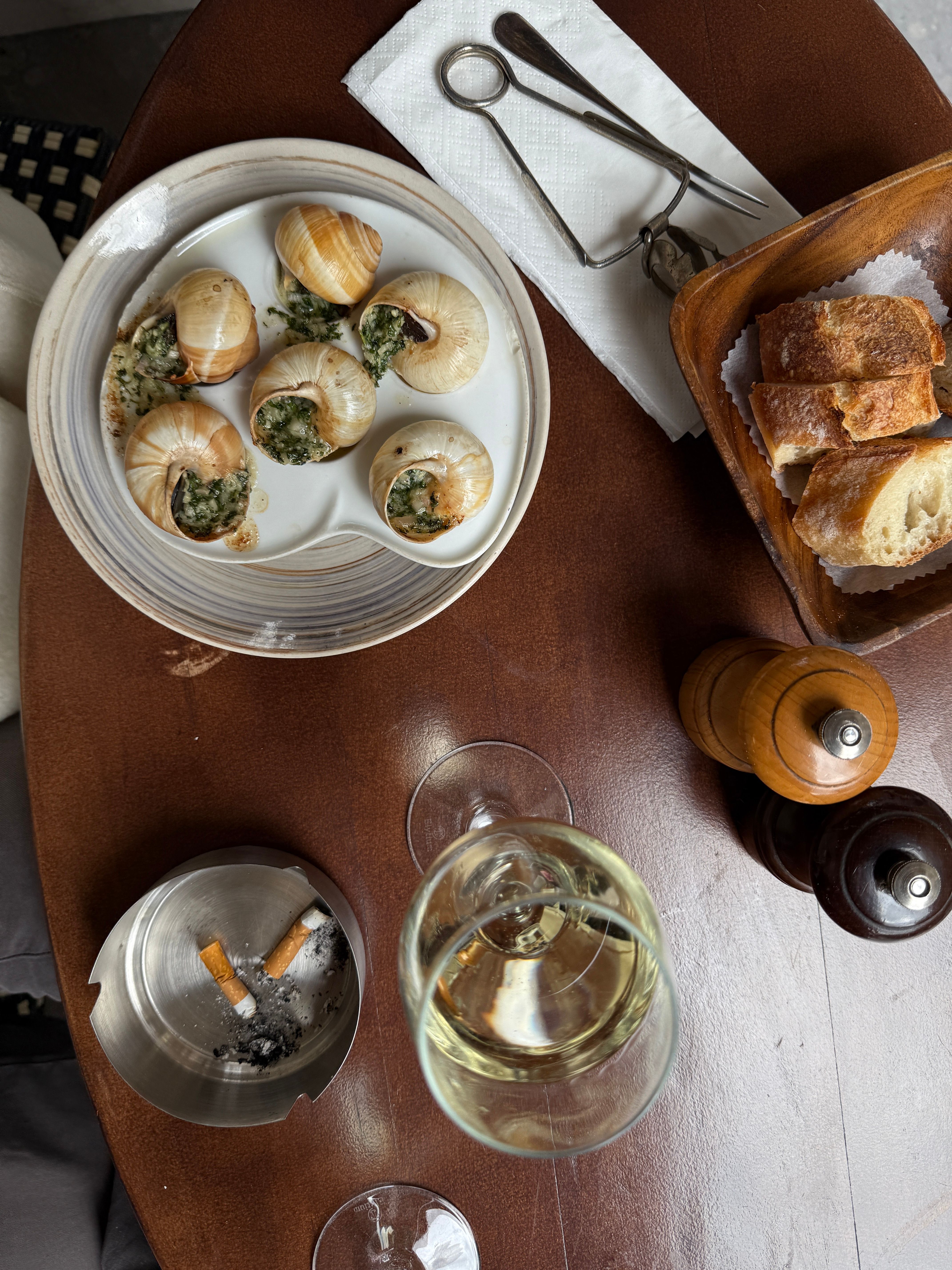 Plate of Escargot Served with Bread and Wine · Free Stock Photo