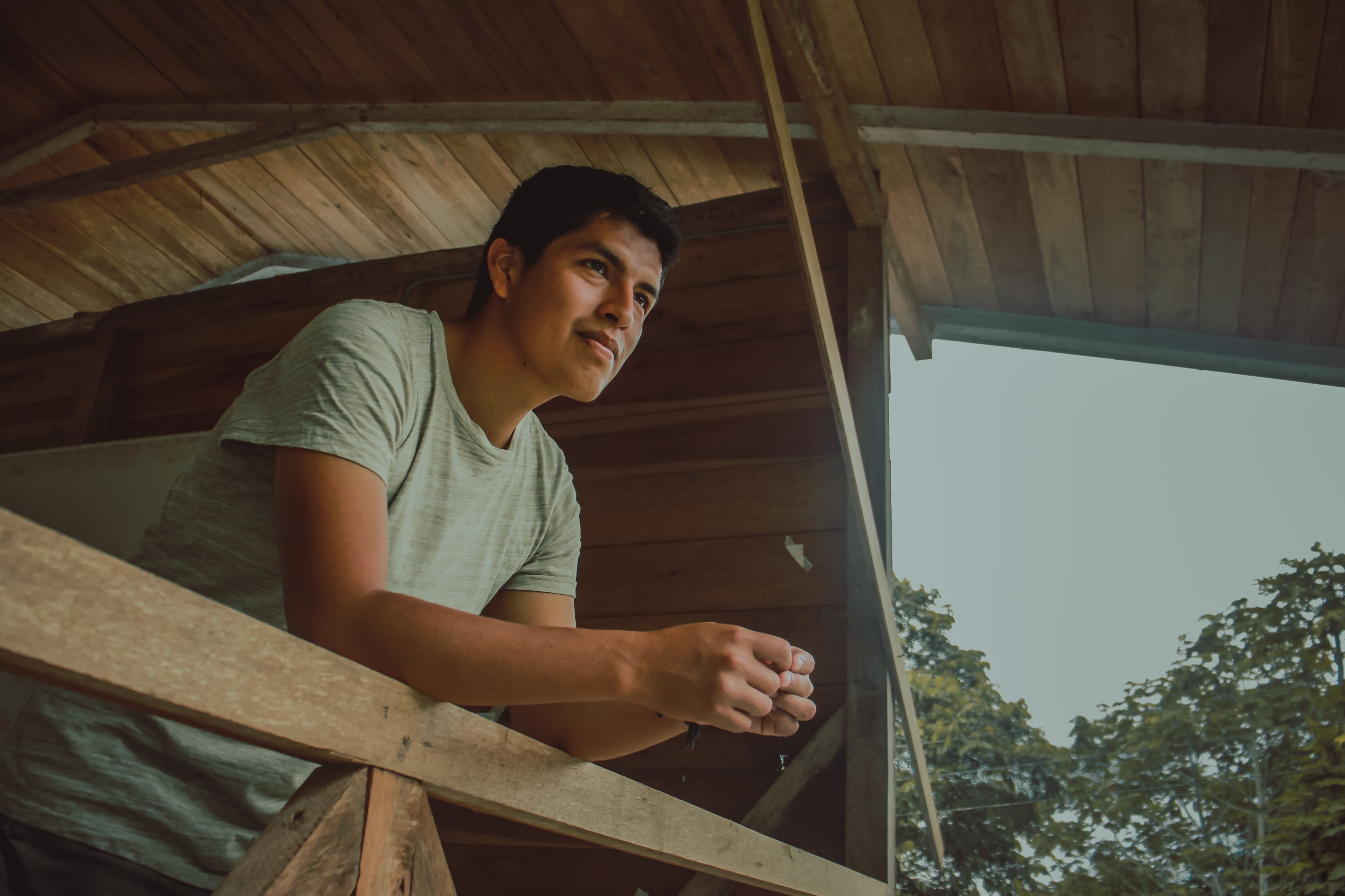 Man Standing Inside Wooden Room · Free Stock Photo