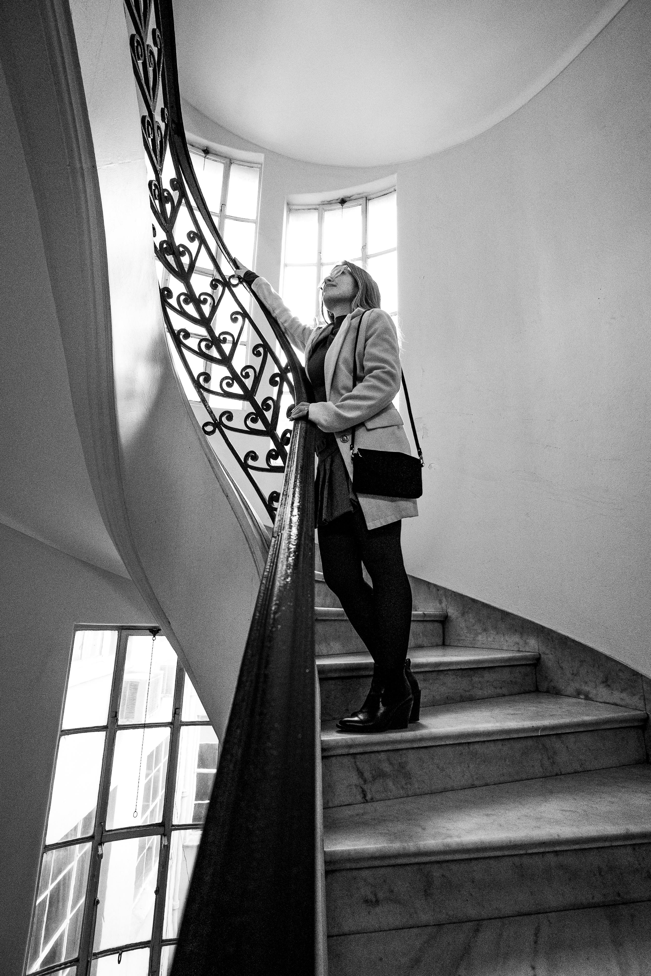 Elegant Black and White Staircase Portrait · Free Stock Photo