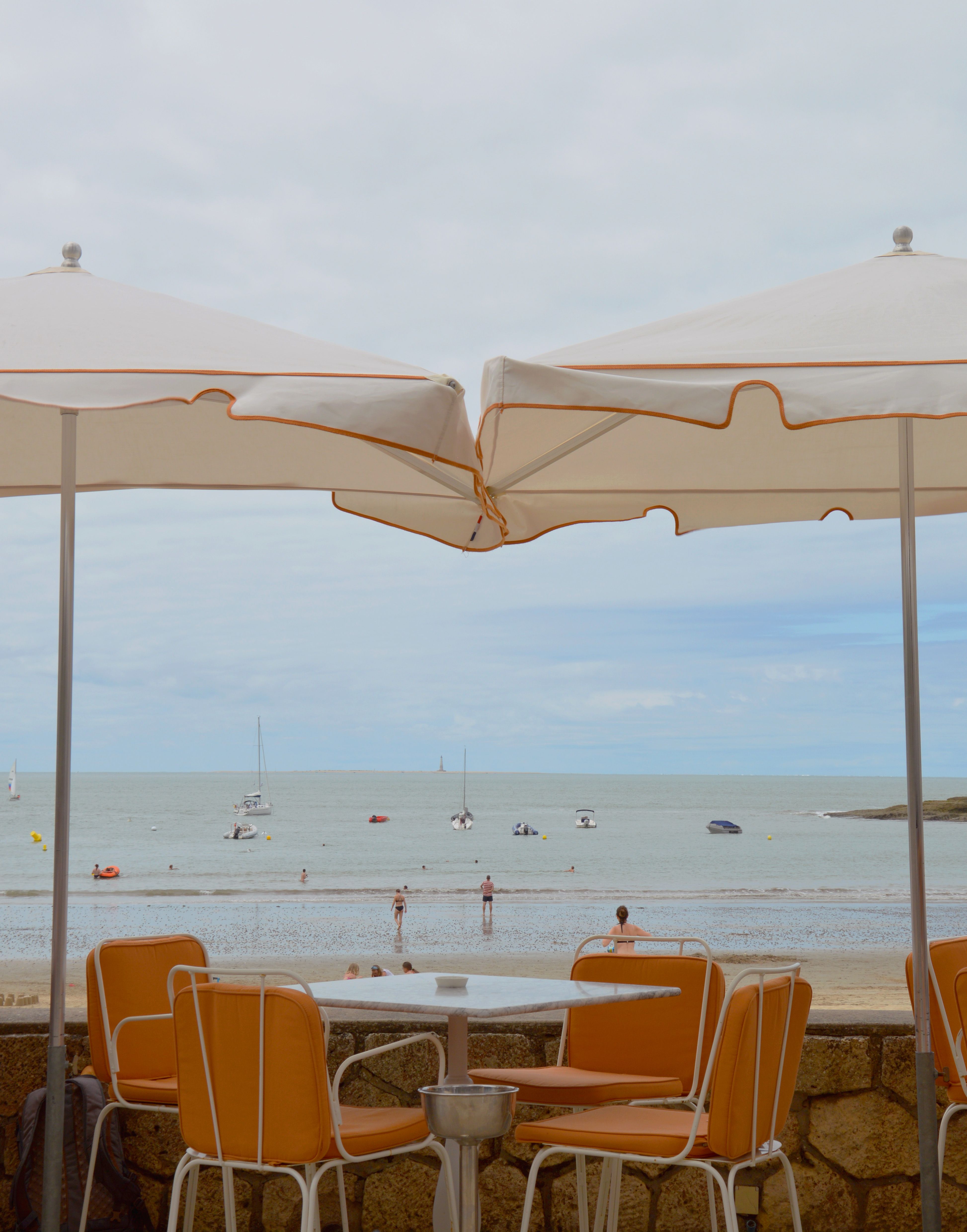 Beachside Cafe Terrace in Saint-Palais-sur-Mer · Free Stock Photo