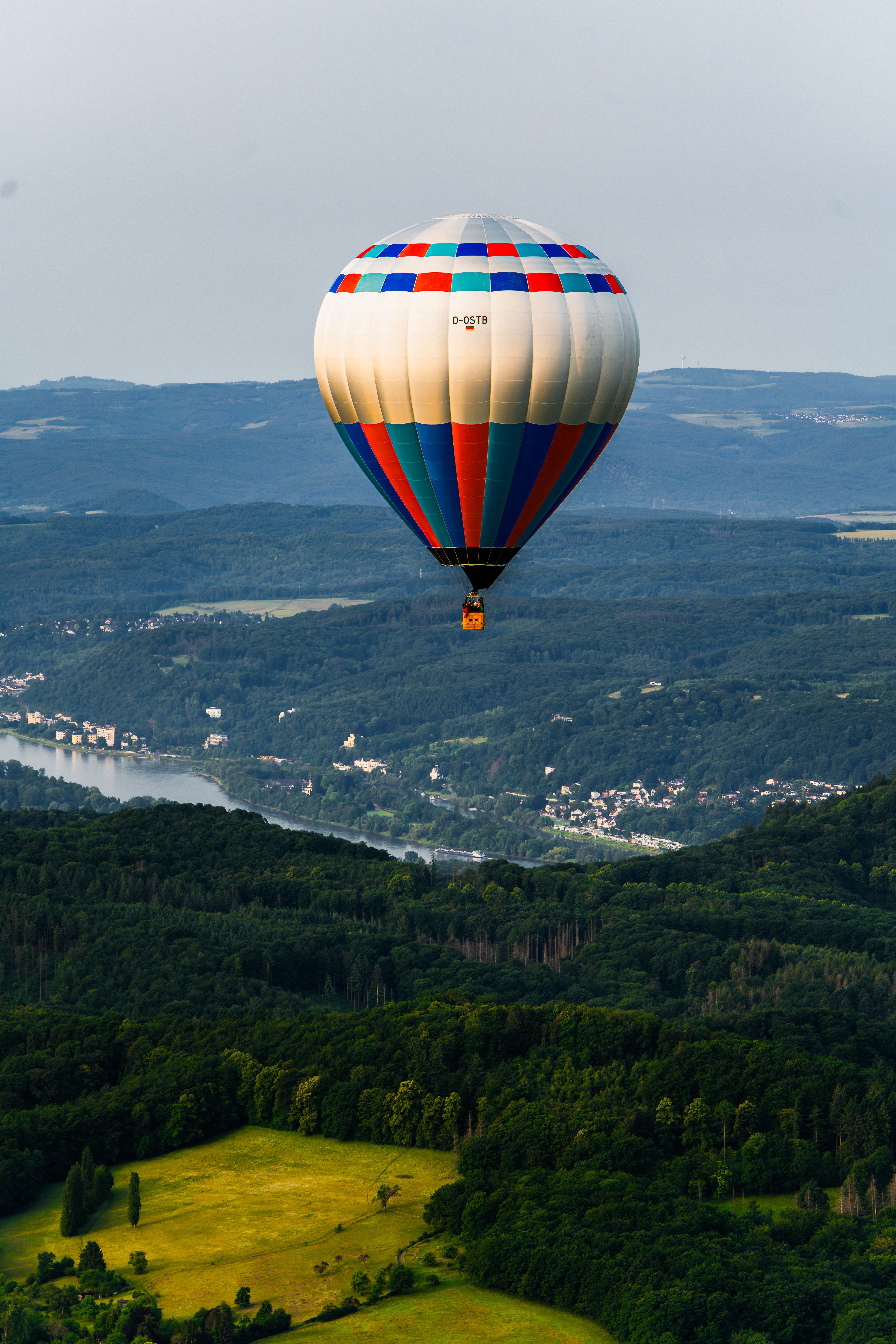 Colorful Hot Air Balloon Over Scenic Bonn Landscape · Free Stock Photo
