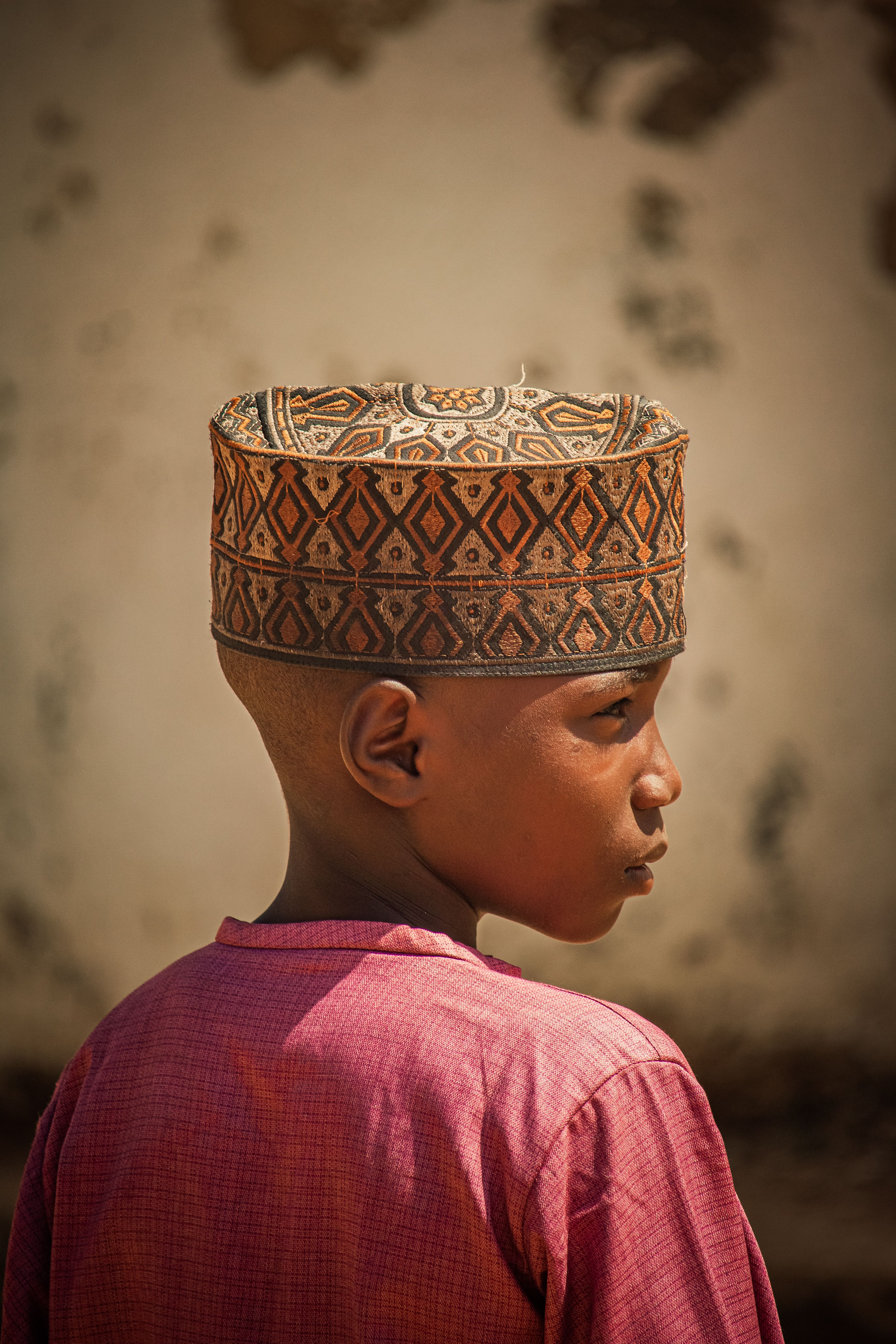 Portrait of Boy in Traditional Hat Outdoors · Free Stock Photo