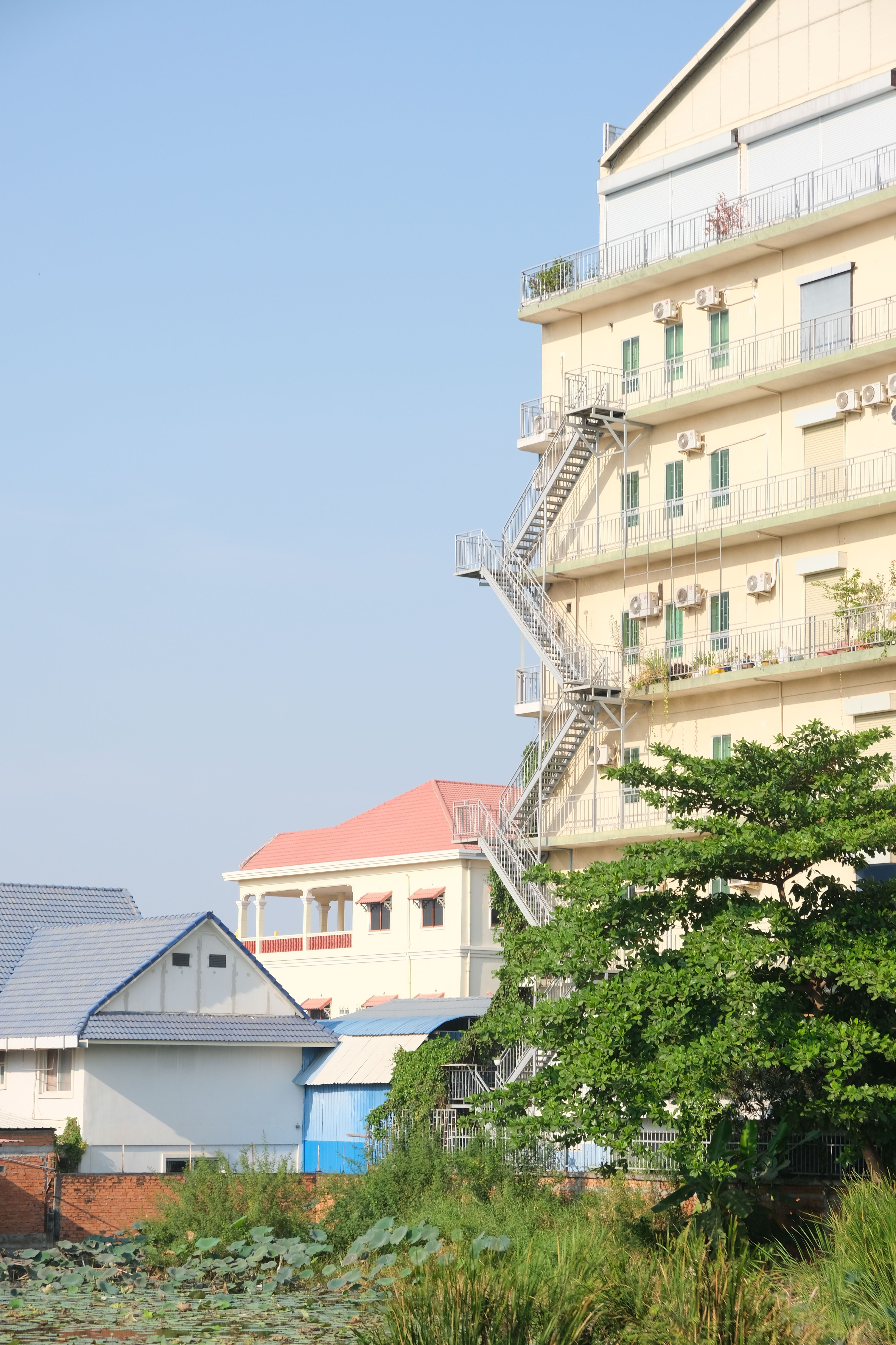 Modern Cambodian Architecture with Metal Staircase · Free Stock Photo
