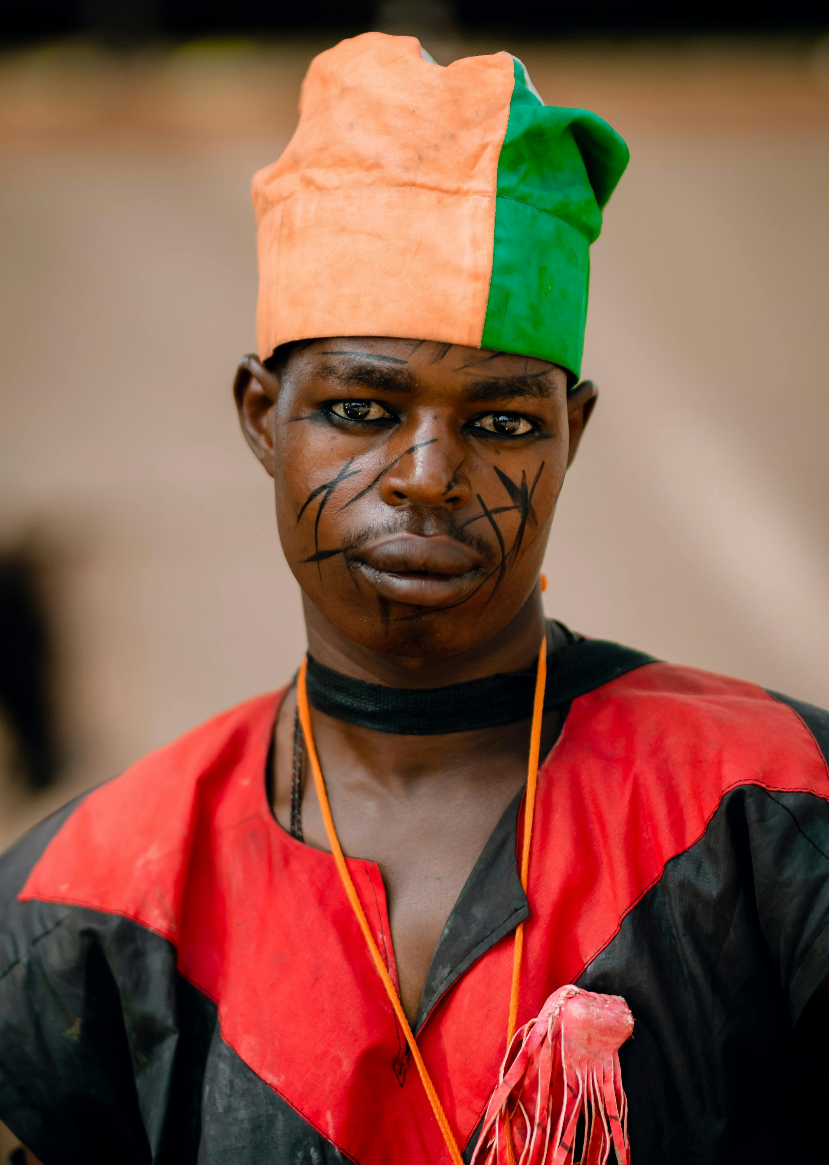 Traditional Nigerian Attire and Face Marking Portrait · Free Stock Photo