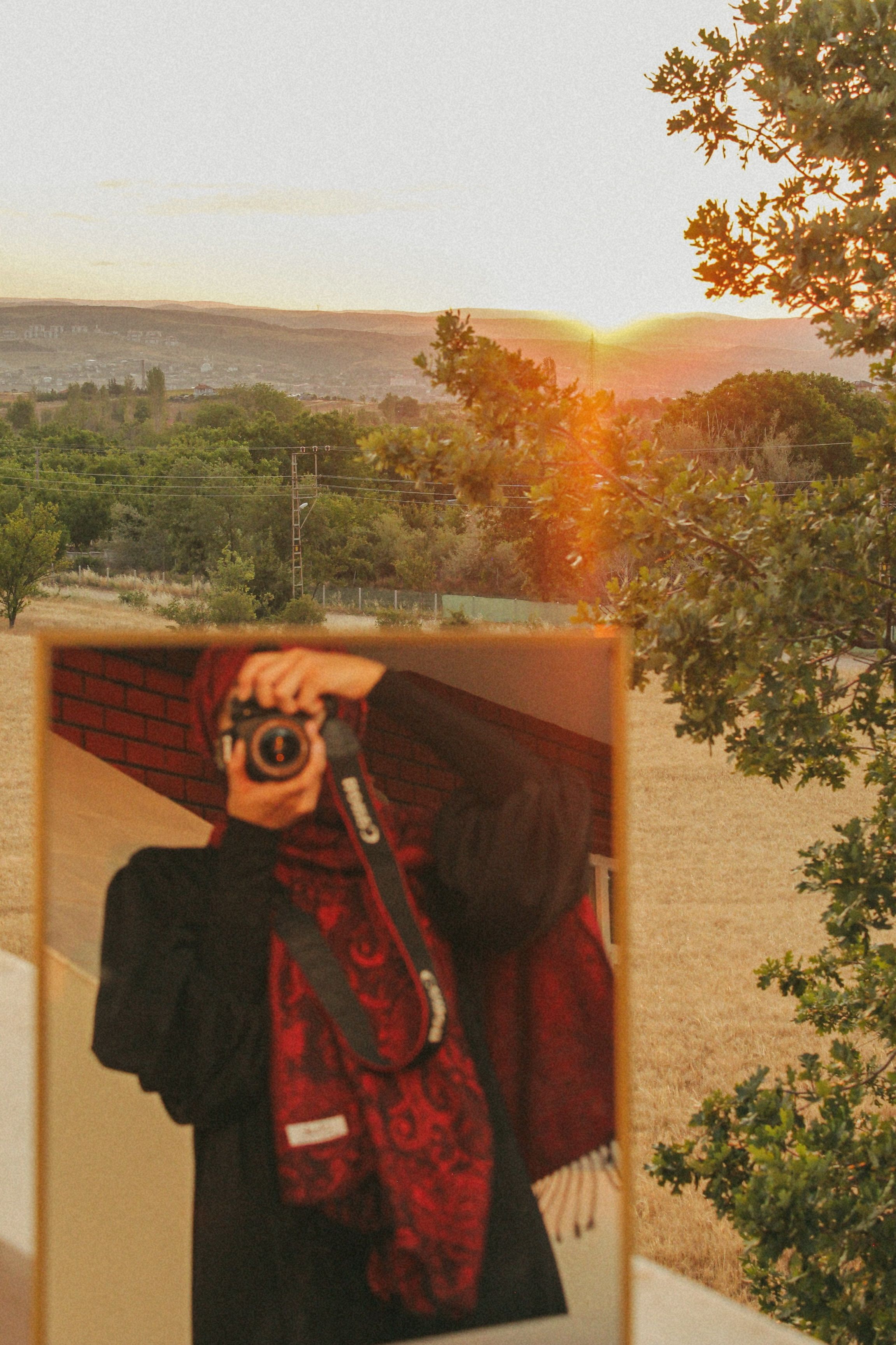 Reflective Self-Portrait at Sunset Outdoors · Free Stock Photo