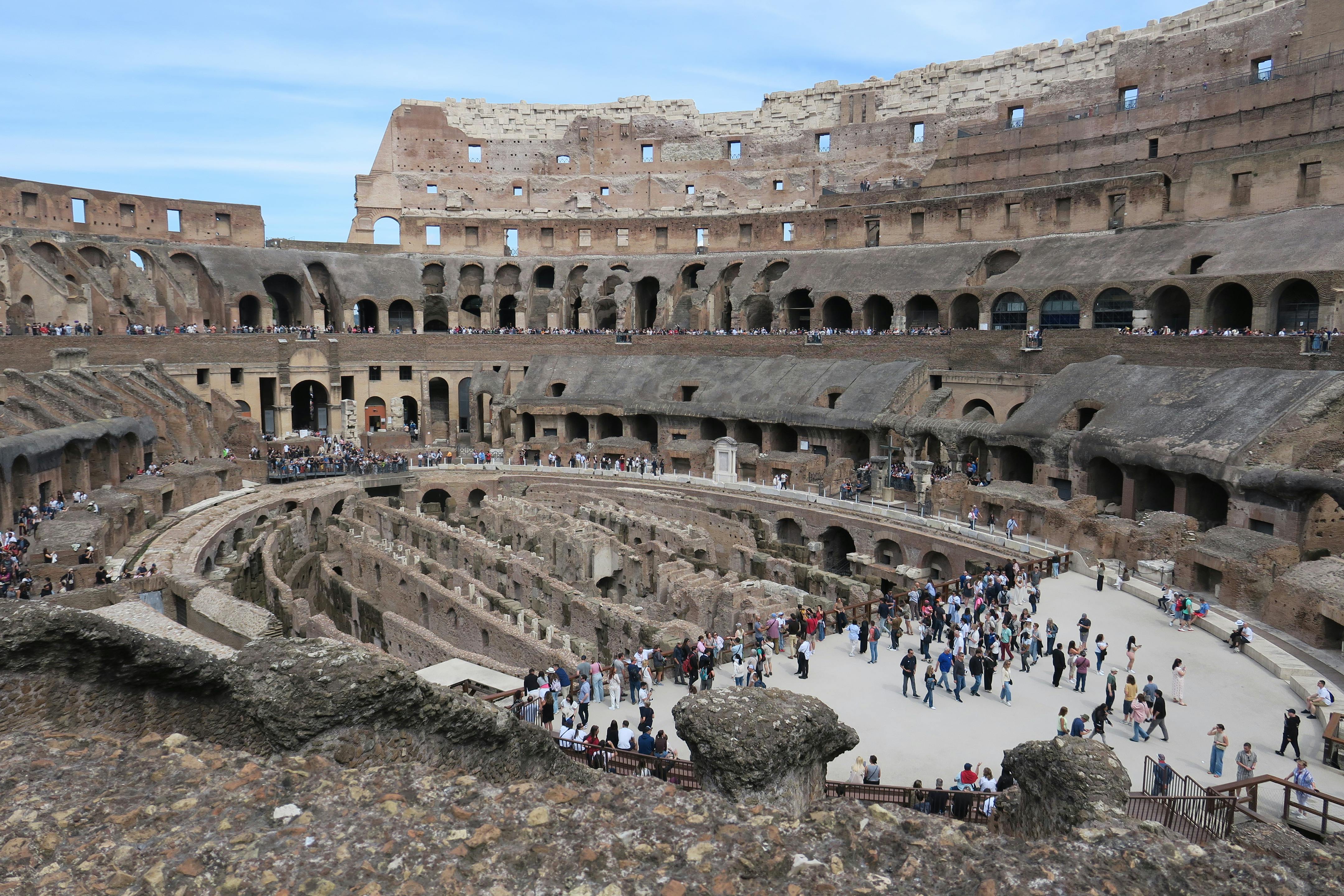 Historic Colosseum Interior with Visitors Crowd · Free Stock Photo