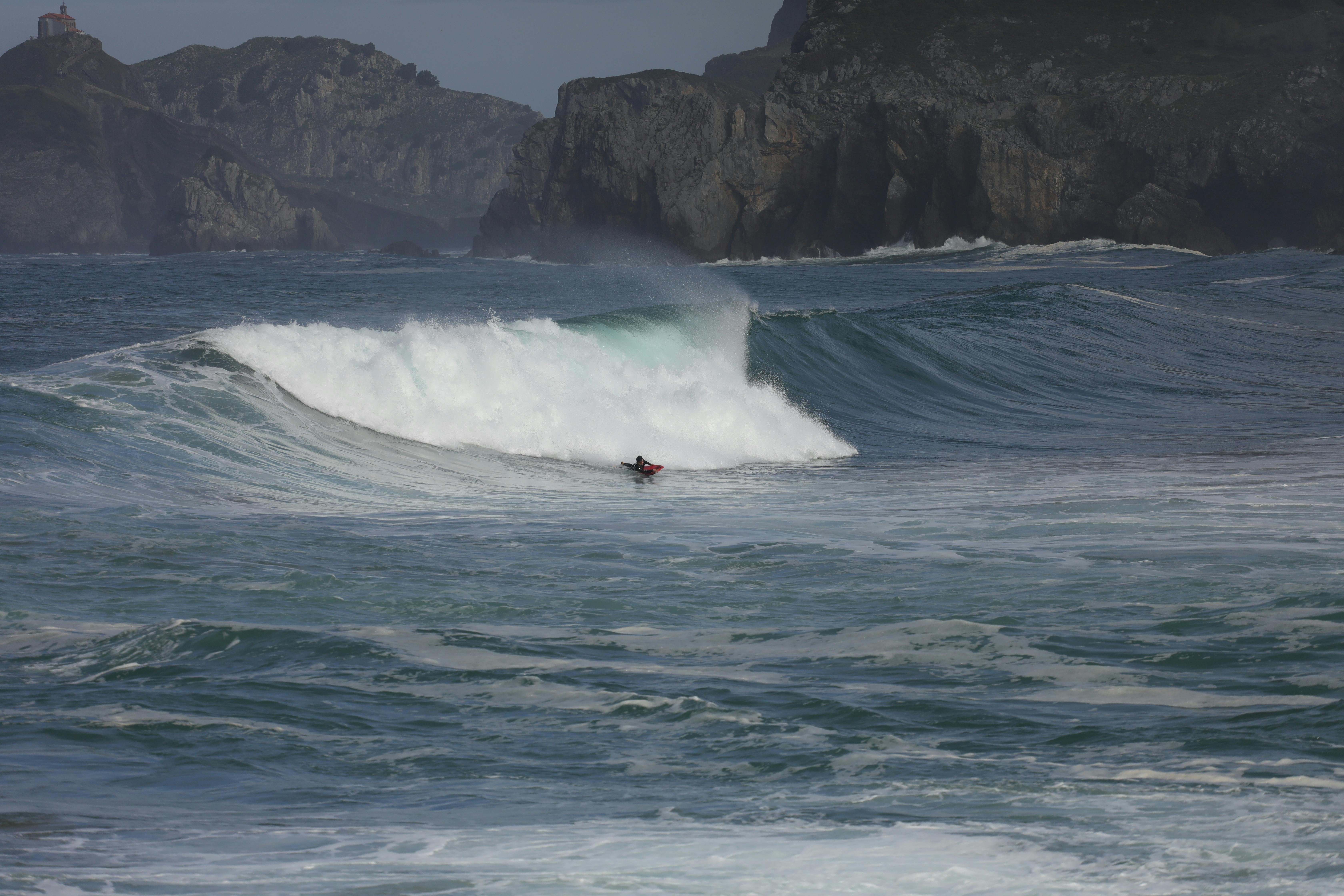 Powerful Wave Surfing in Scenic Basque Coastline · Free Stock Photo