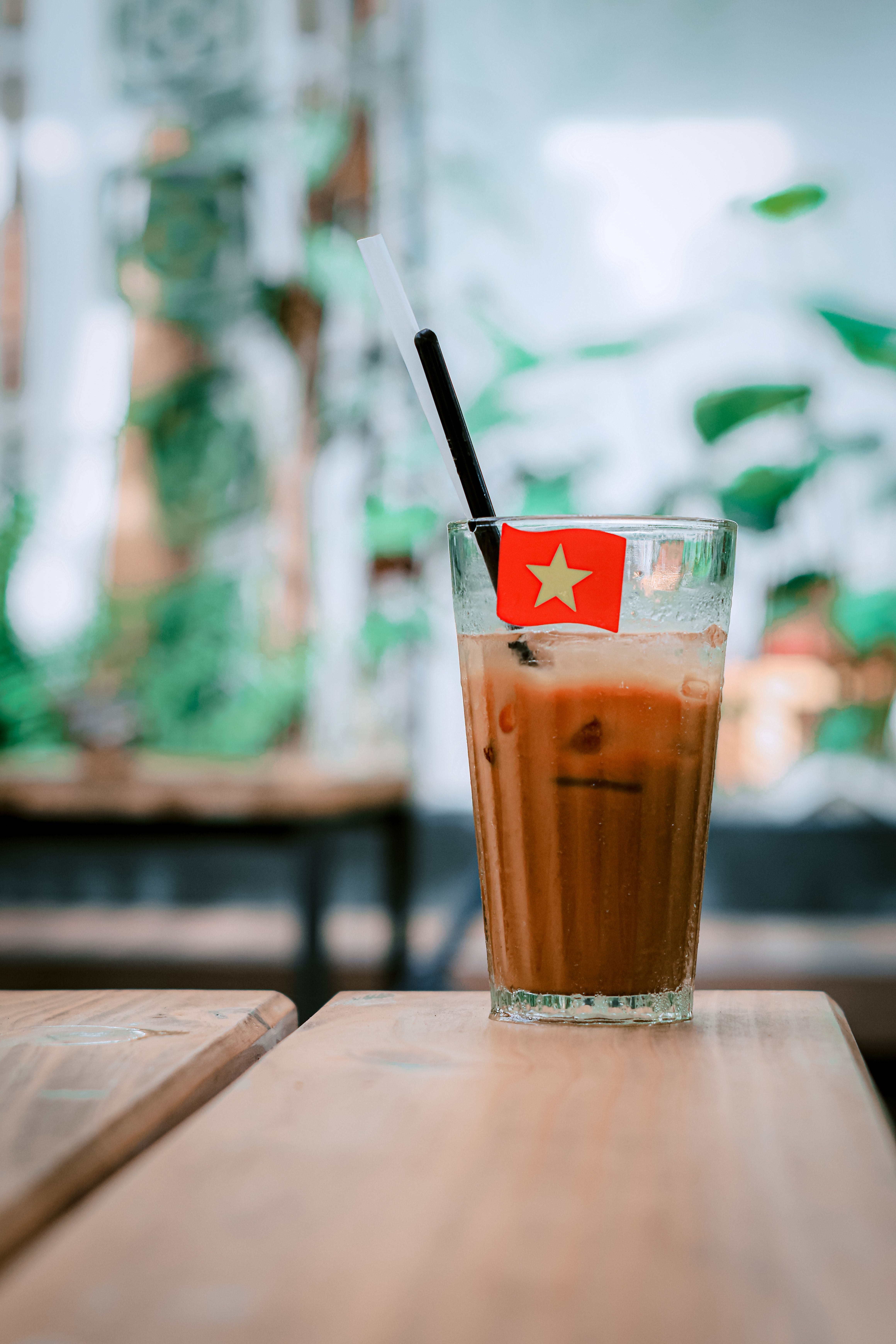 Iced Coffee with Vietnamese Flag in Cafe Setting · Free Stock Photo