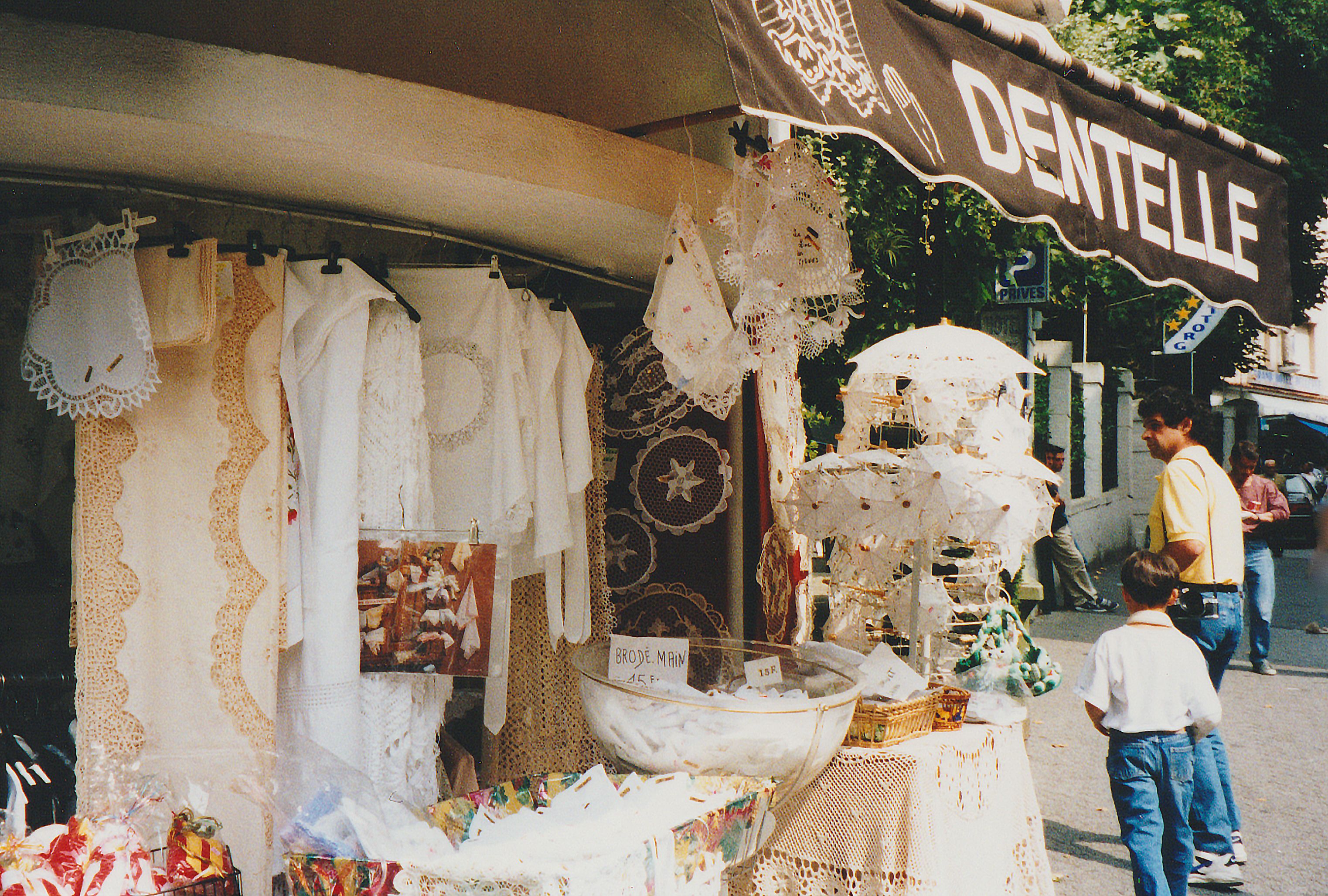 Charming Lace Shop Display in Lourdes, France · Free Stock Photo