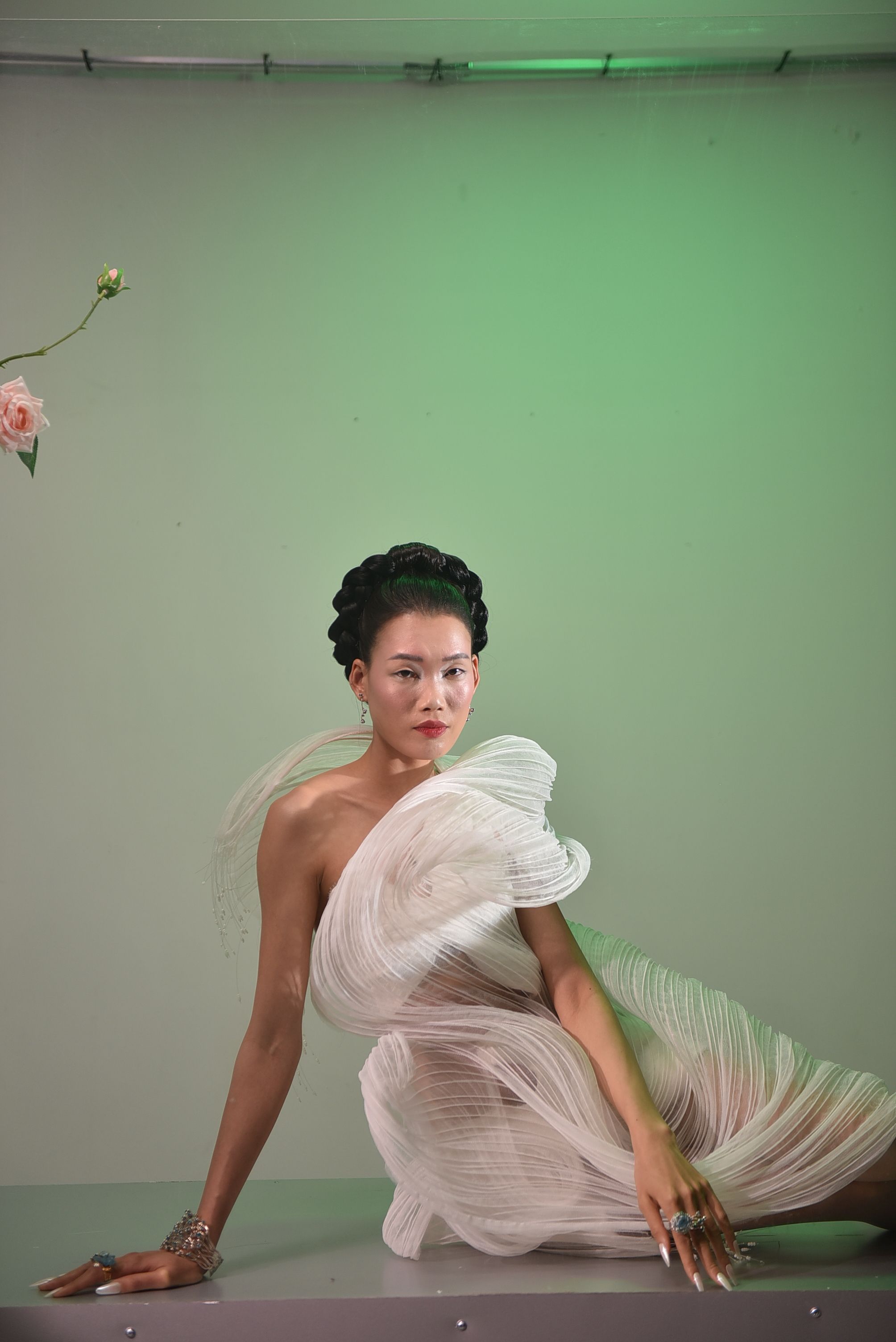 Elegant Woman Posing in Avant-Garde Dress · Free Stock Photo