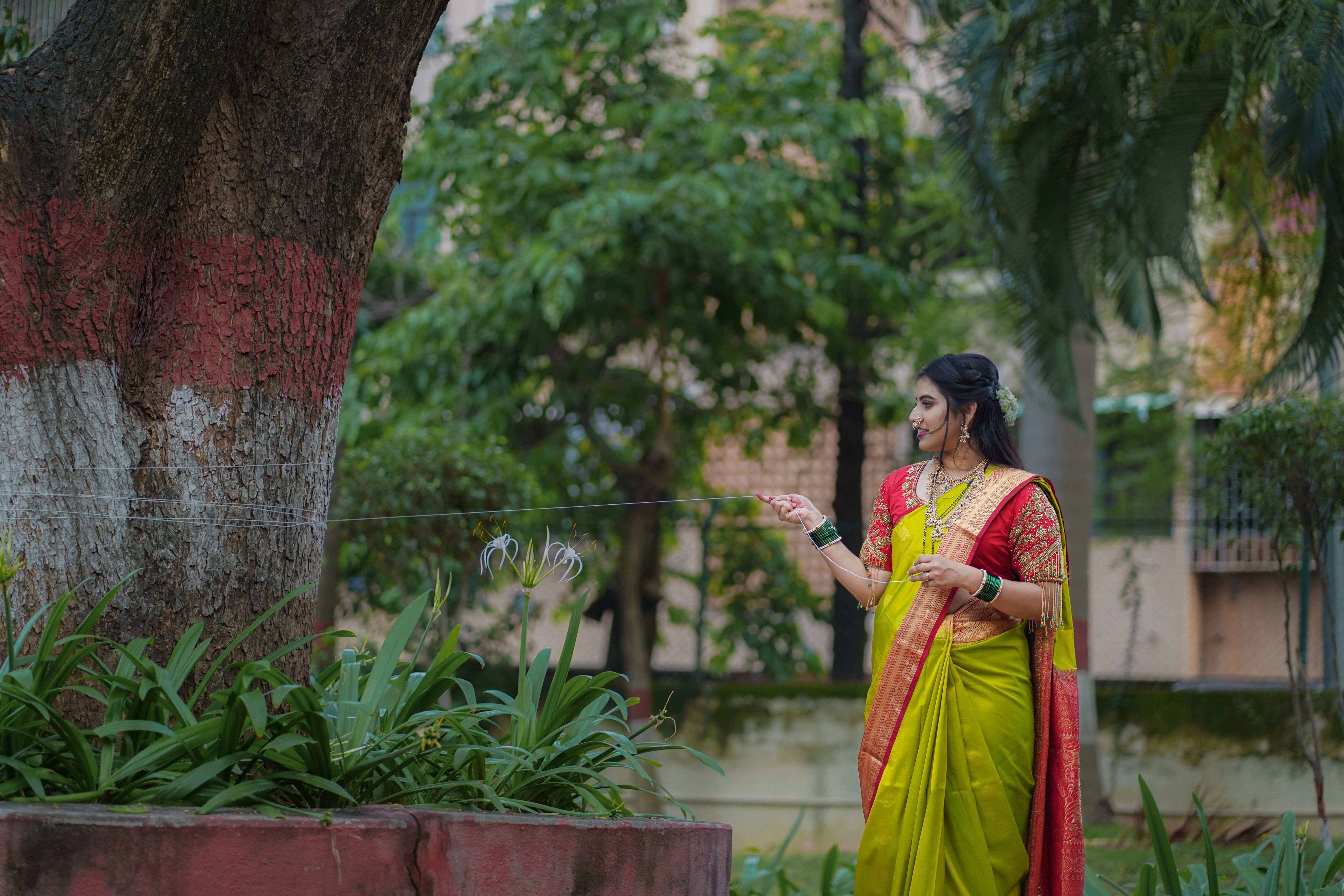 Traditional Indian Woman Performing Ritual Outdoors · Free Stock Photo