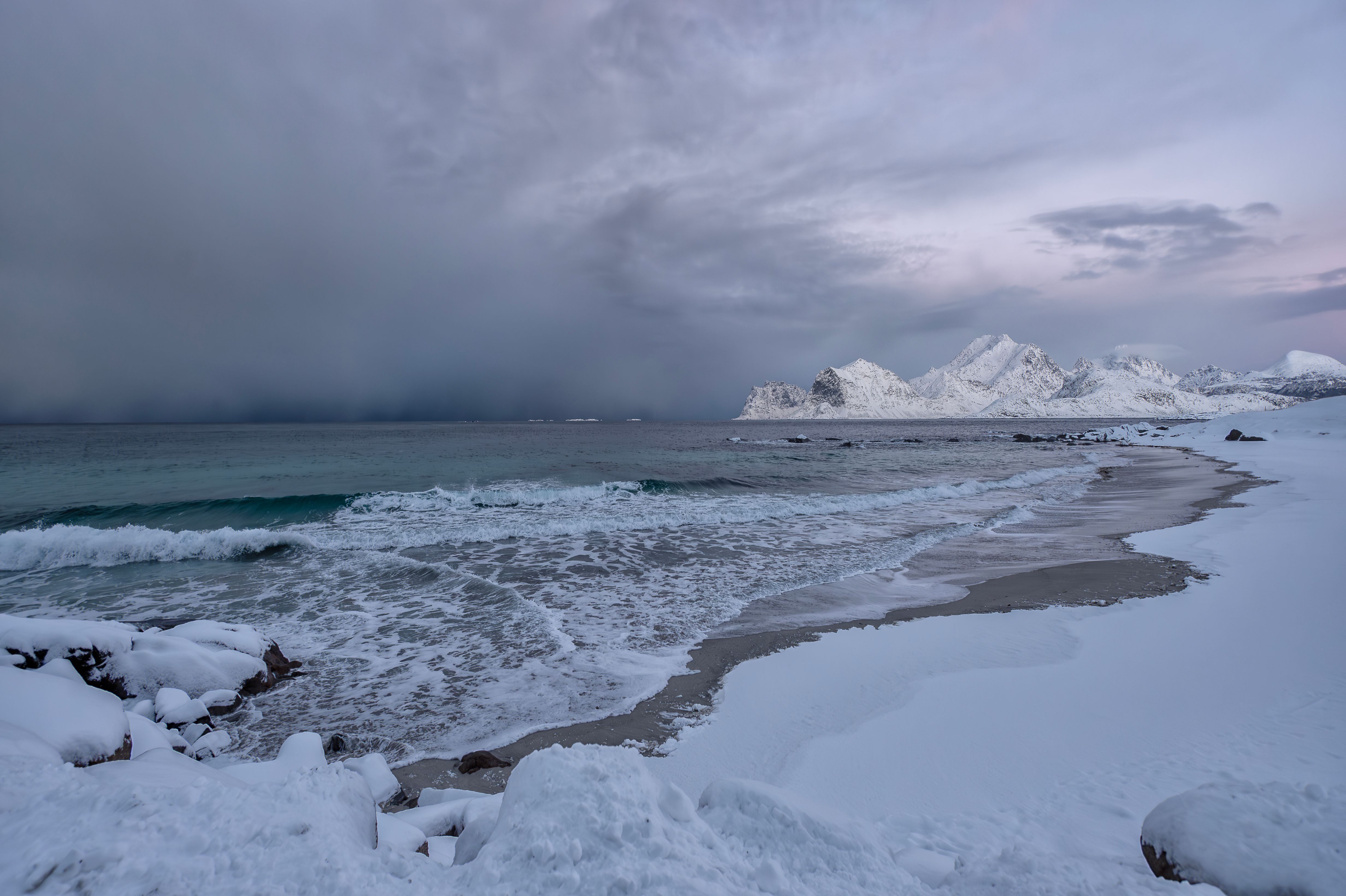 Winter Beach with Snow and Mountain View · Free Stock Photo