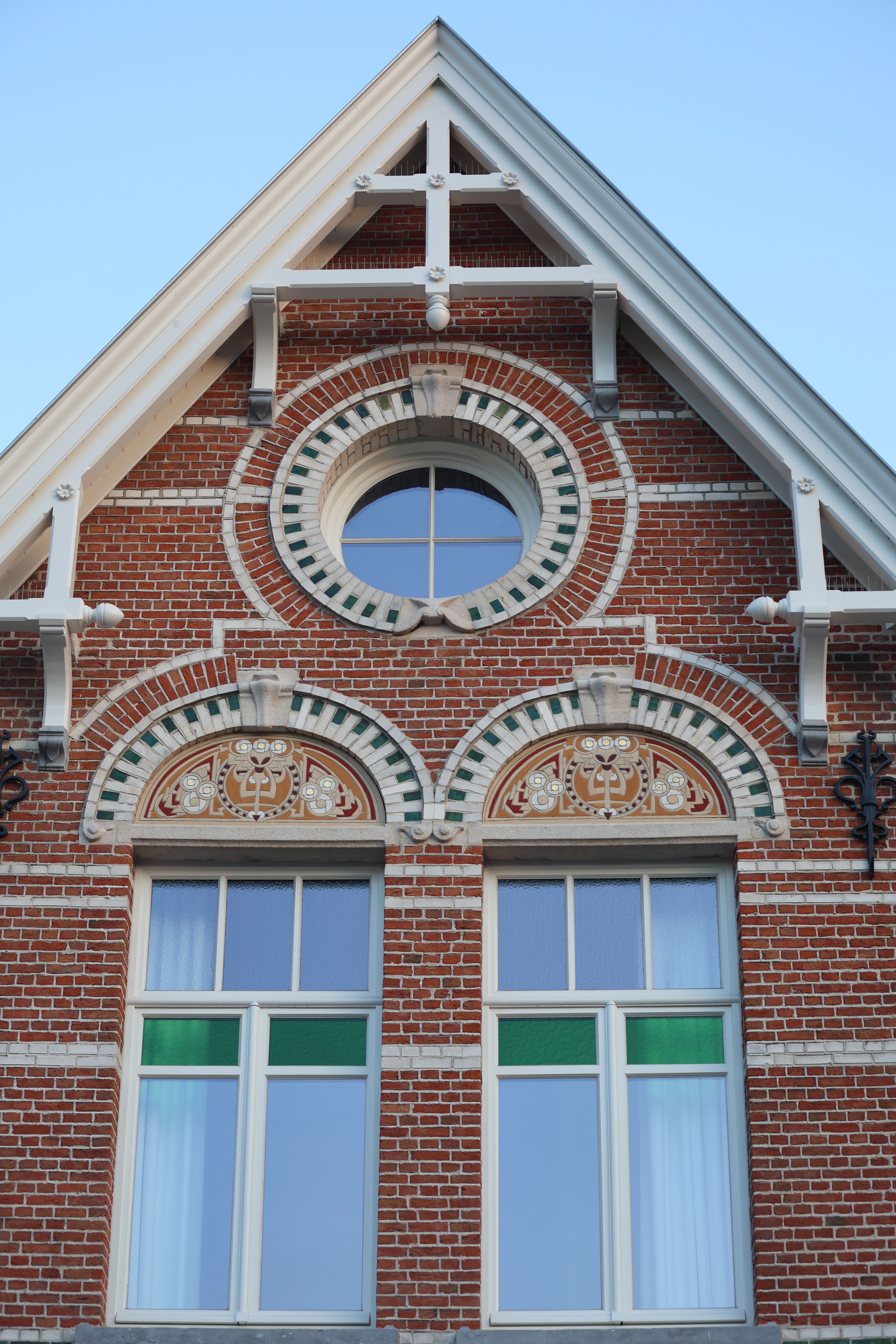 Elegant Historic Brick Architecture with Ornate Details · Free Stock Photo