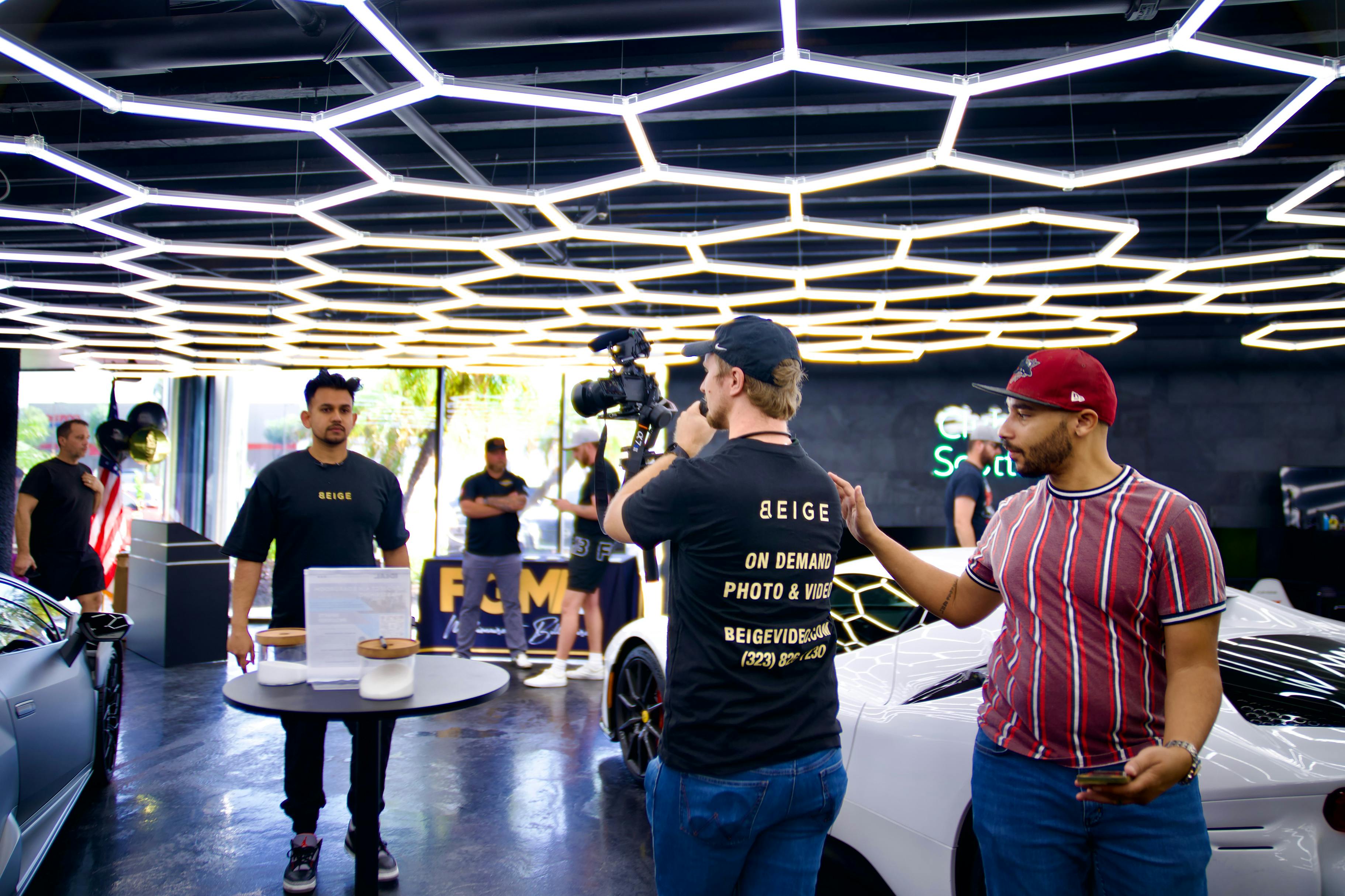 Behind-the-Scenes Luxury Car Video Shoot · Free Stock Photo