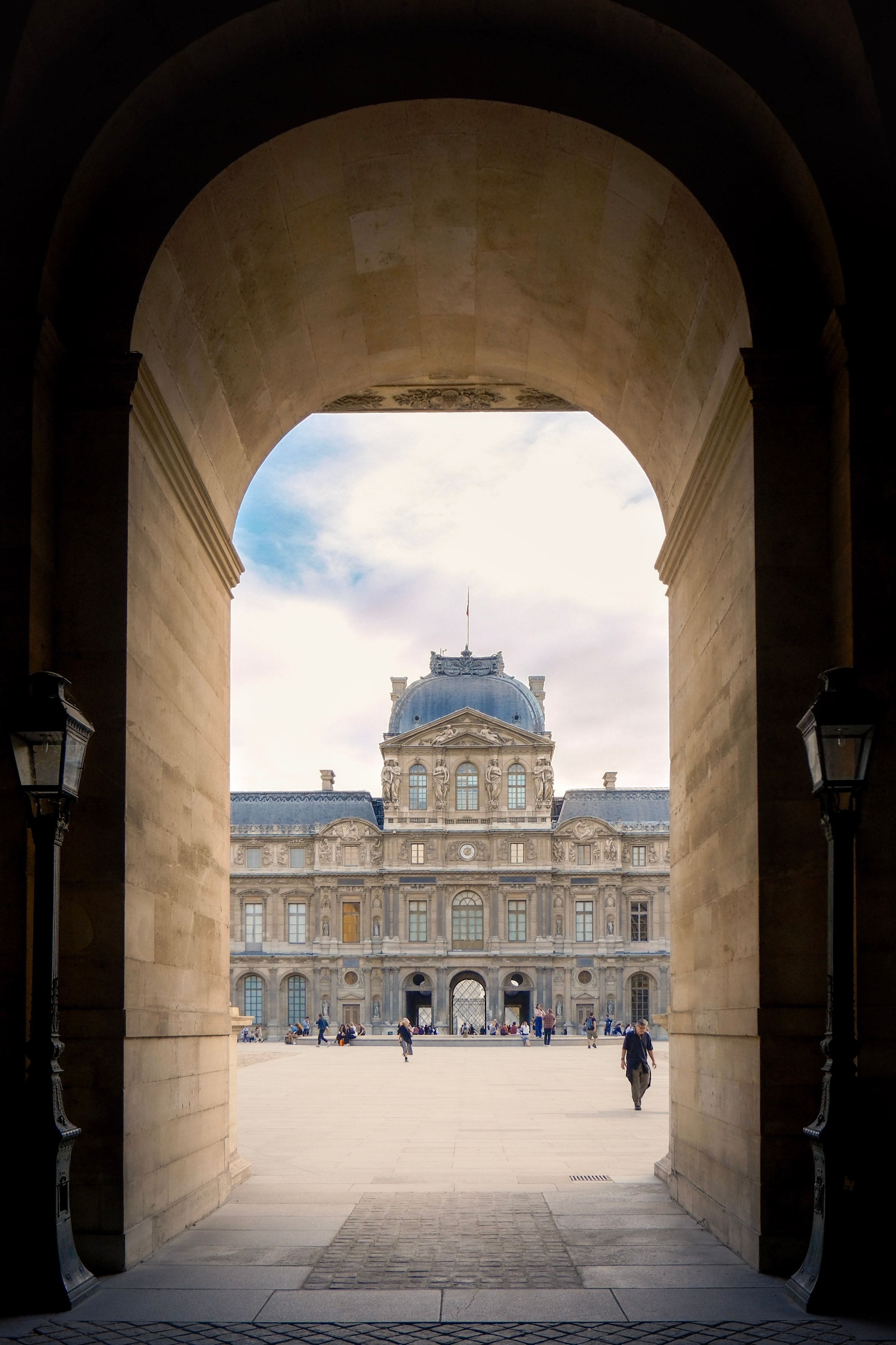 Historic Louvre Museum Entrance in Paris · Free Stock Photo