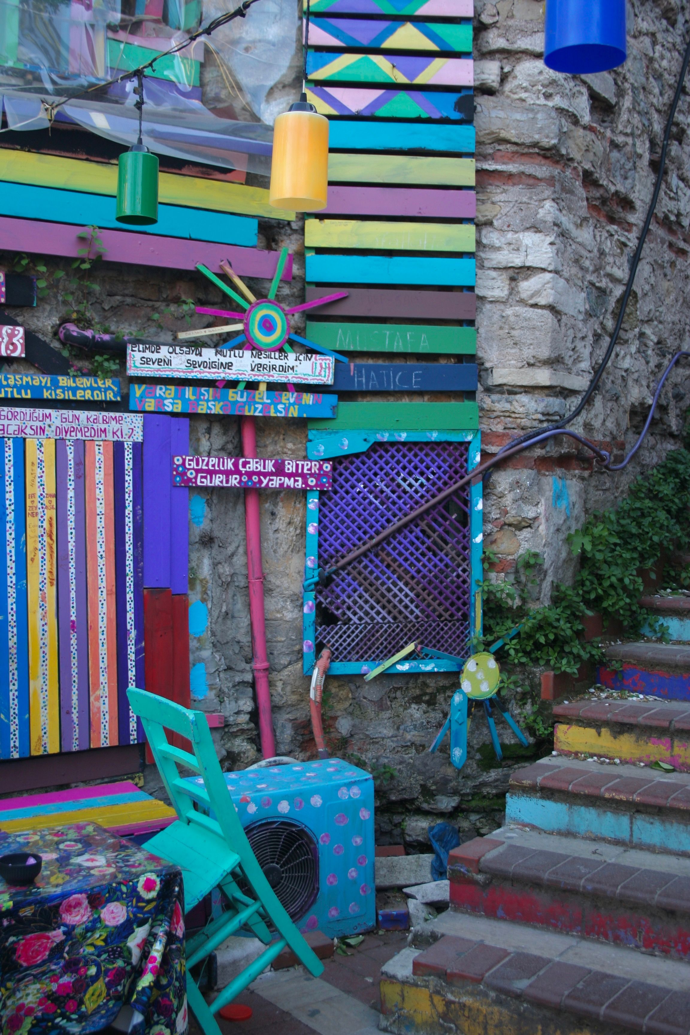 Vibrant Colorful Alleyway with Painted Details · Free Stock Photo
