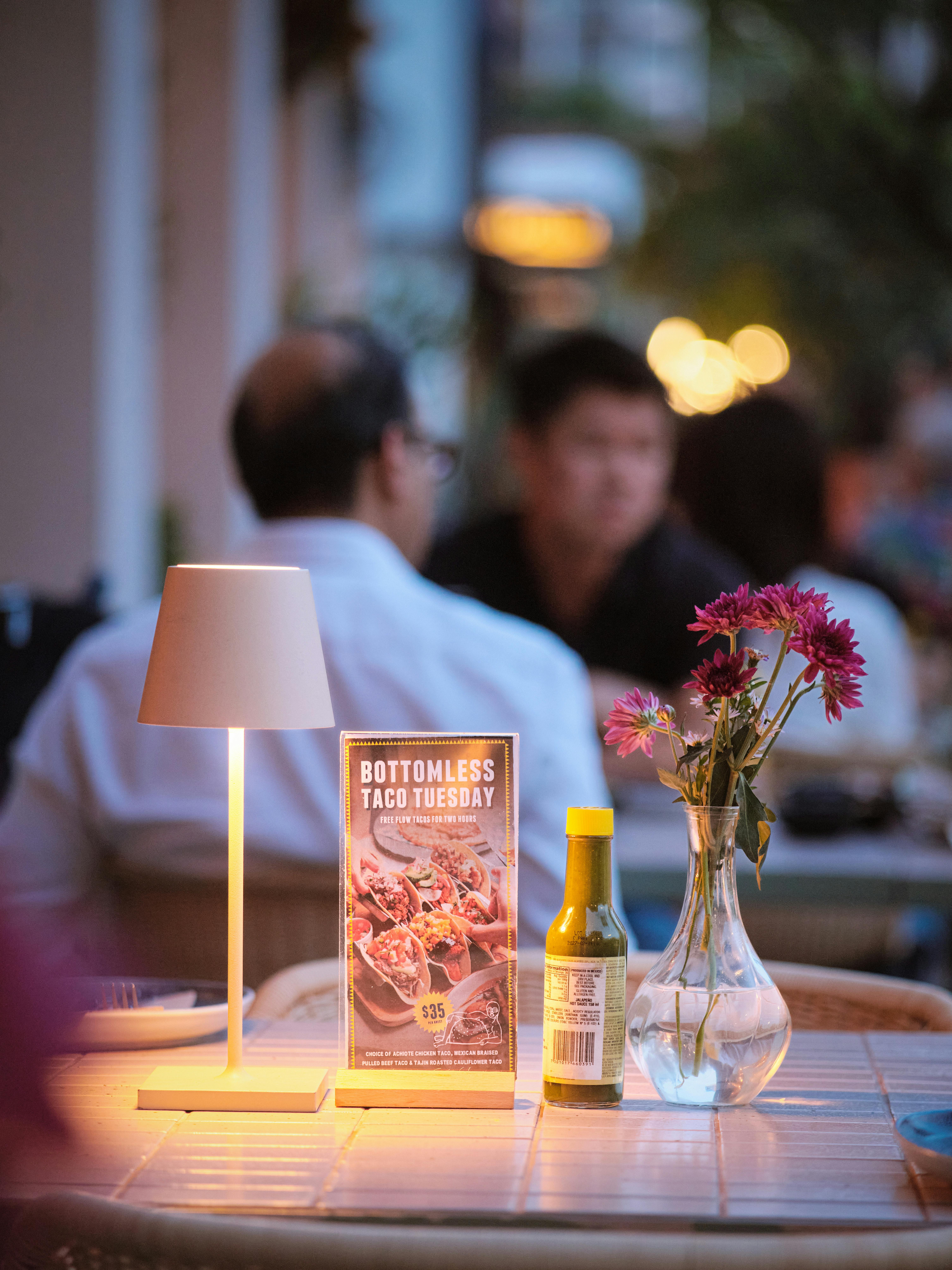 Cozy Outdoor Dining with Taco Tuesday Sign · Free Stock Photo