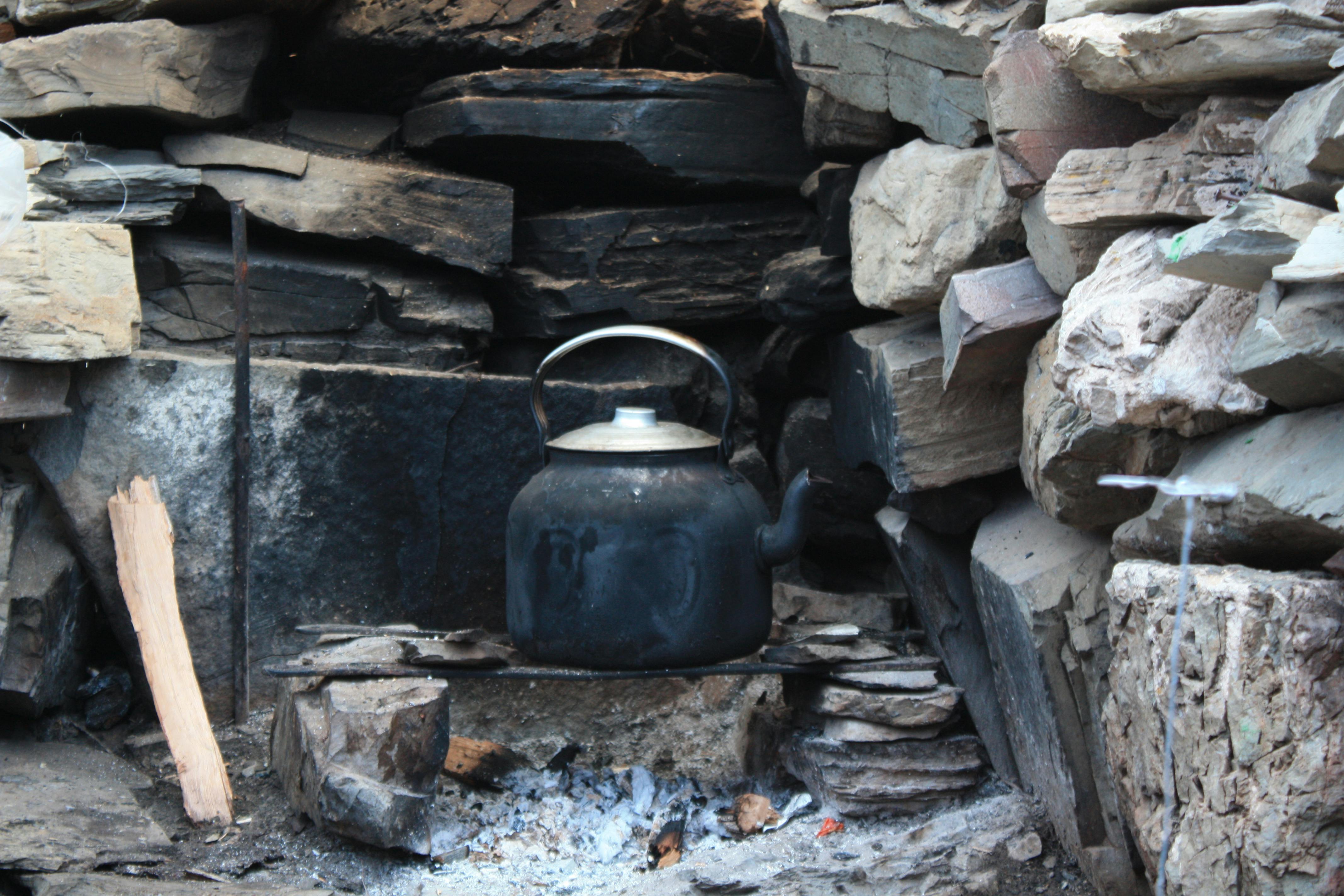 Vintage Kettle on Rustic Stone Fireplace · Free Stock Photo