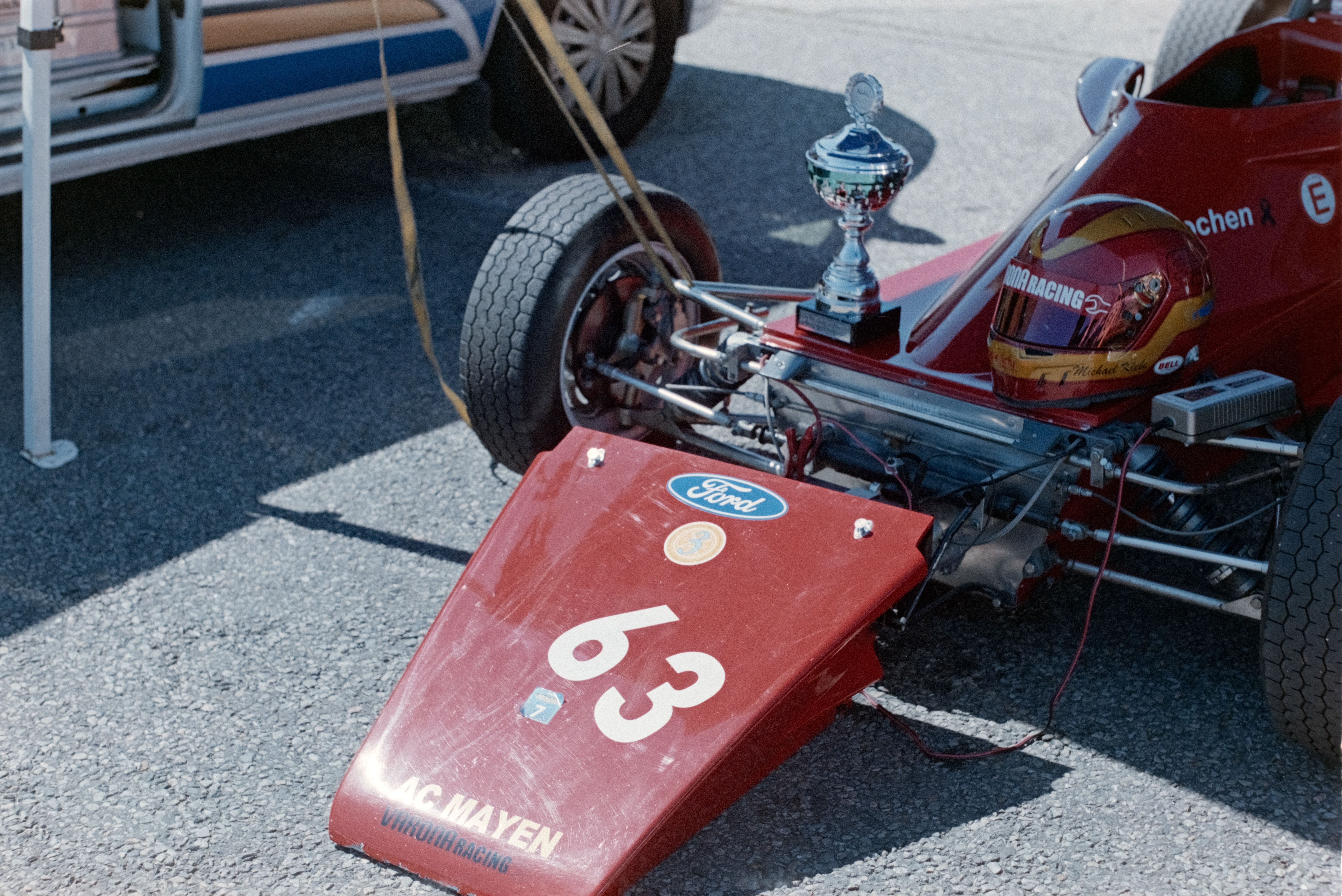 Vintage Racing Car with Trophy and Helmet · Free Stock Photo