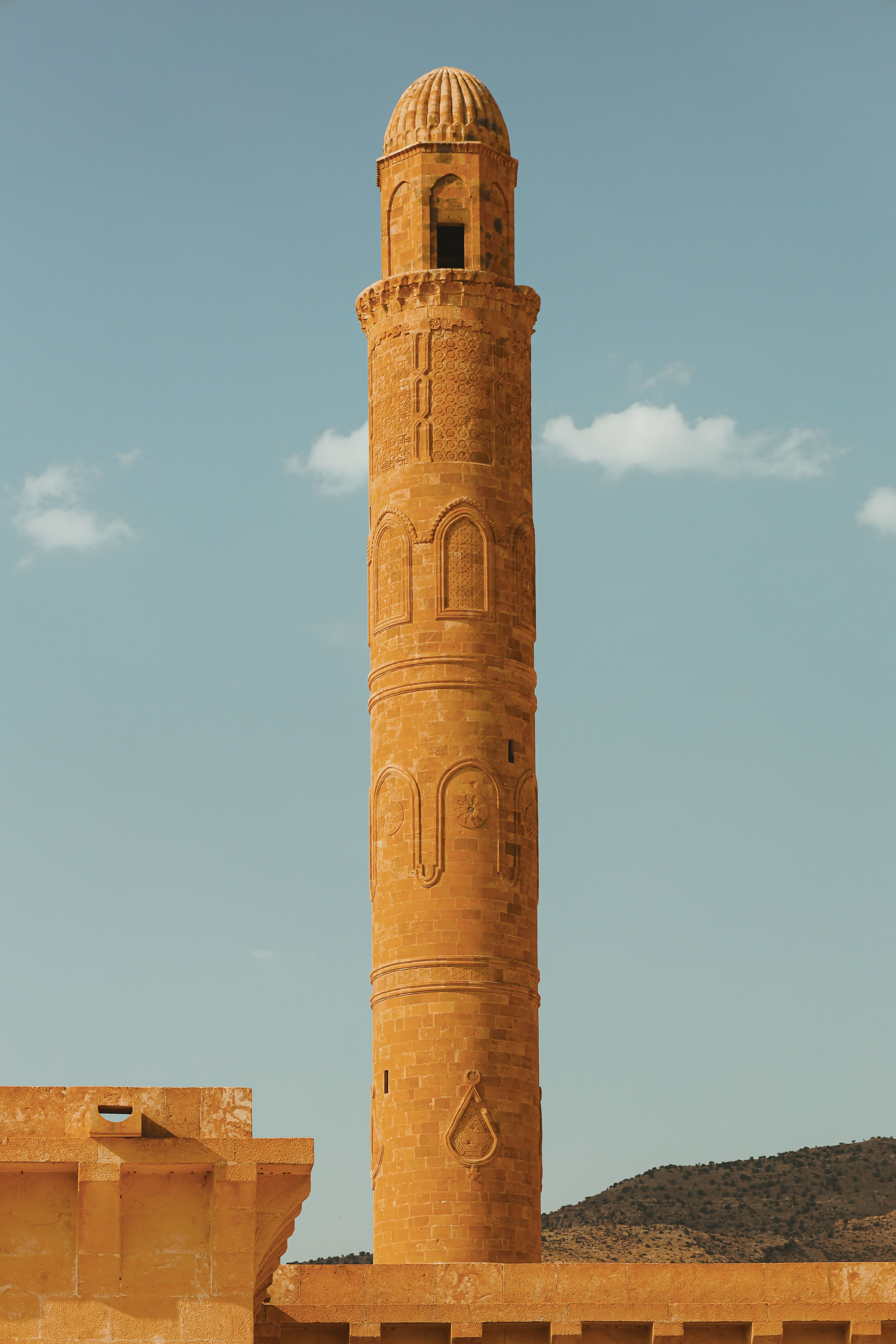 Ancient Minaret Under Clear Blue Sky · Free Stock Photo
