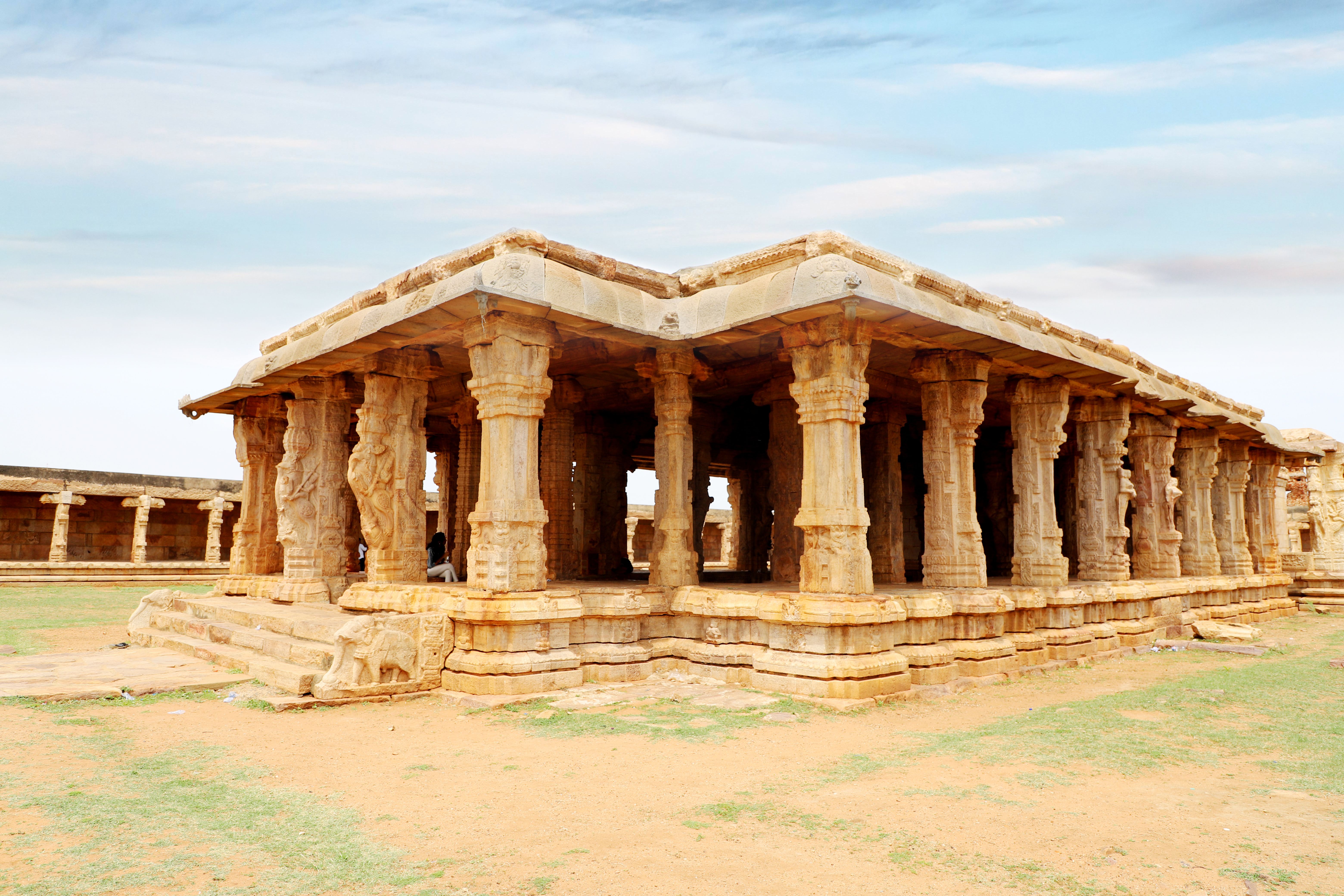 Ancient Stone Temple with Ornate Columns · Free Stock Photo