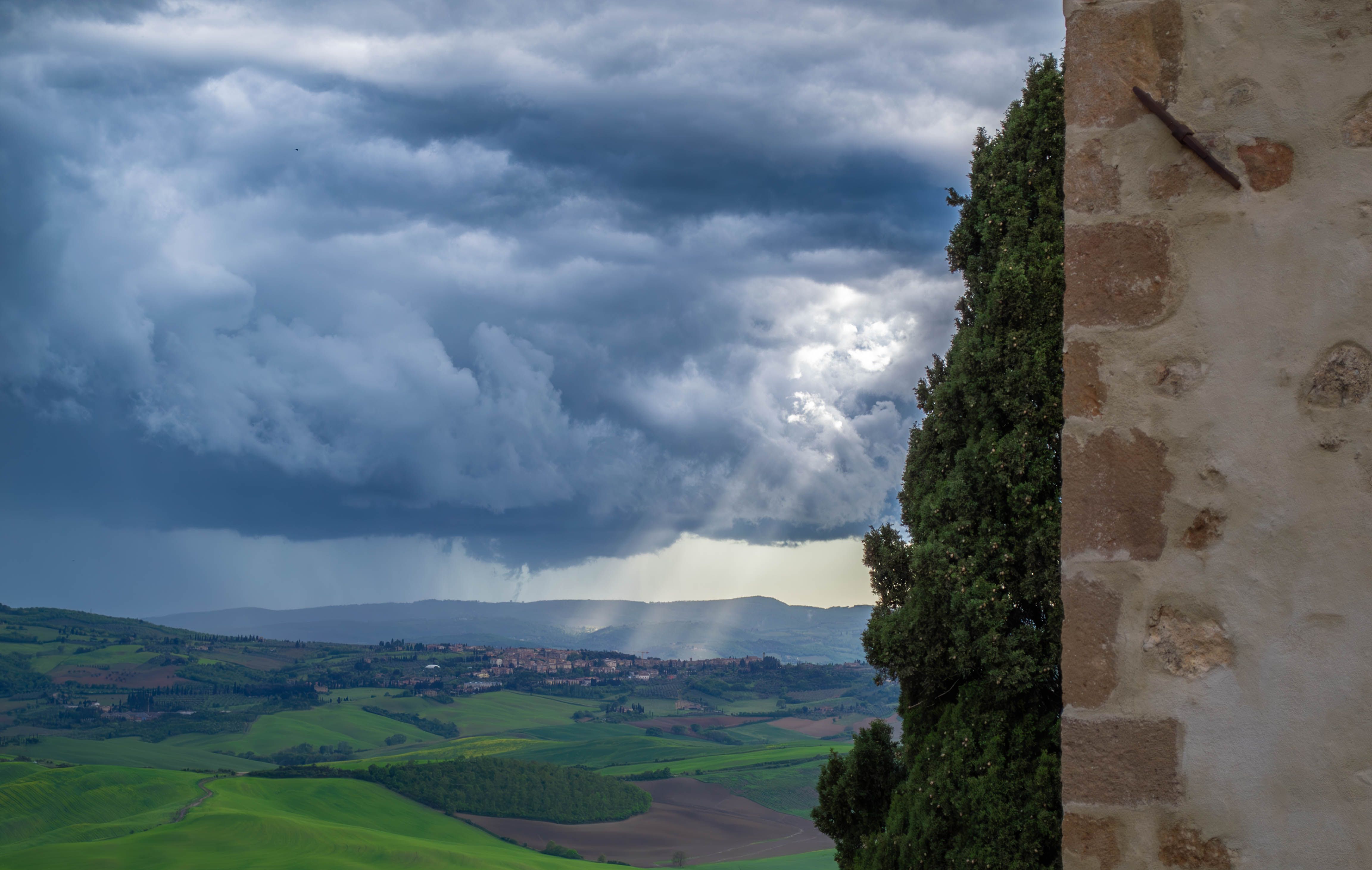 Dramatic Tuscan Landscape with Storm Clouds · Free Stock Photo