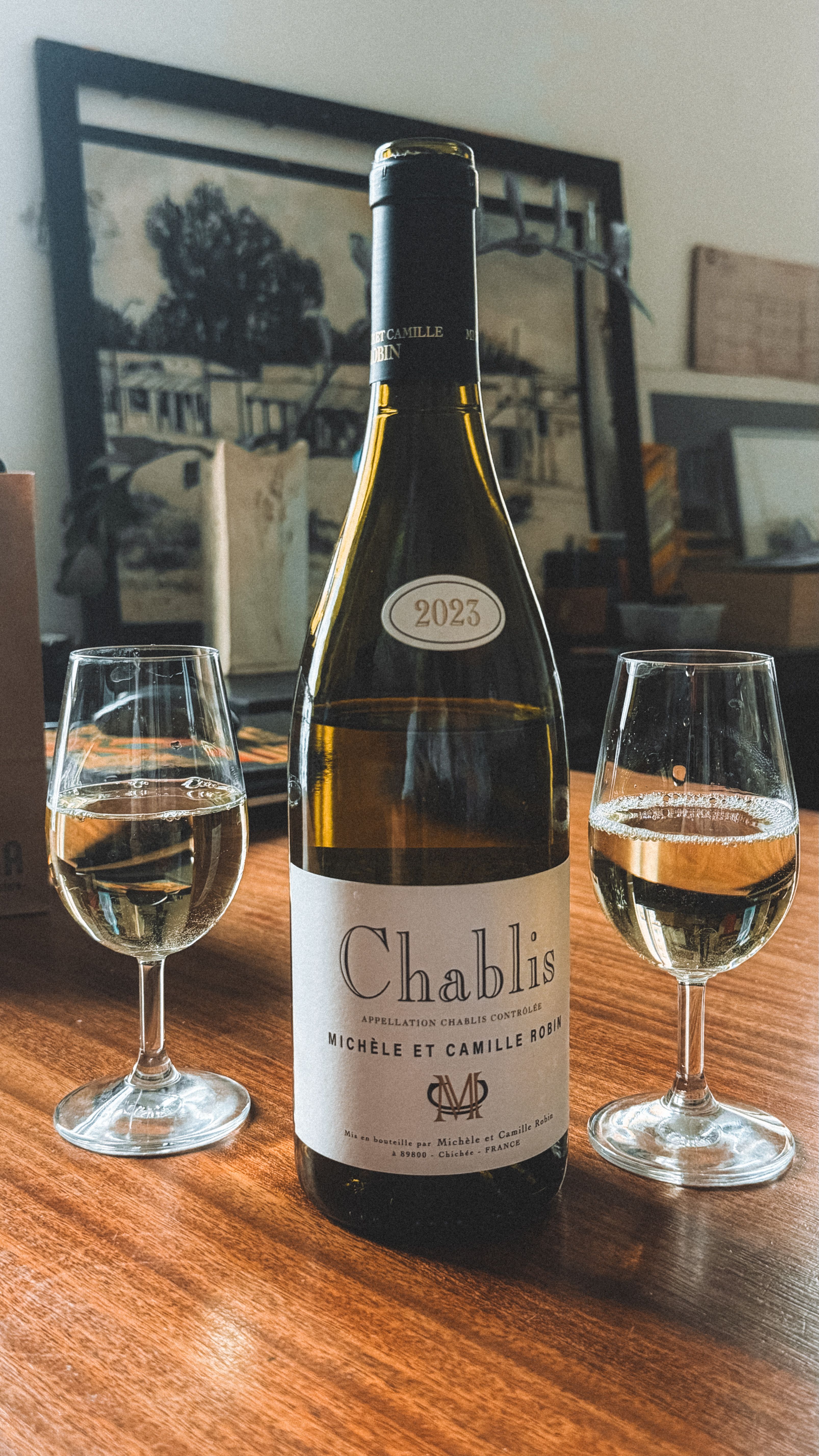 Elegant French Chablis Wine with Glasses on Wooden Table · Free Stock Photo