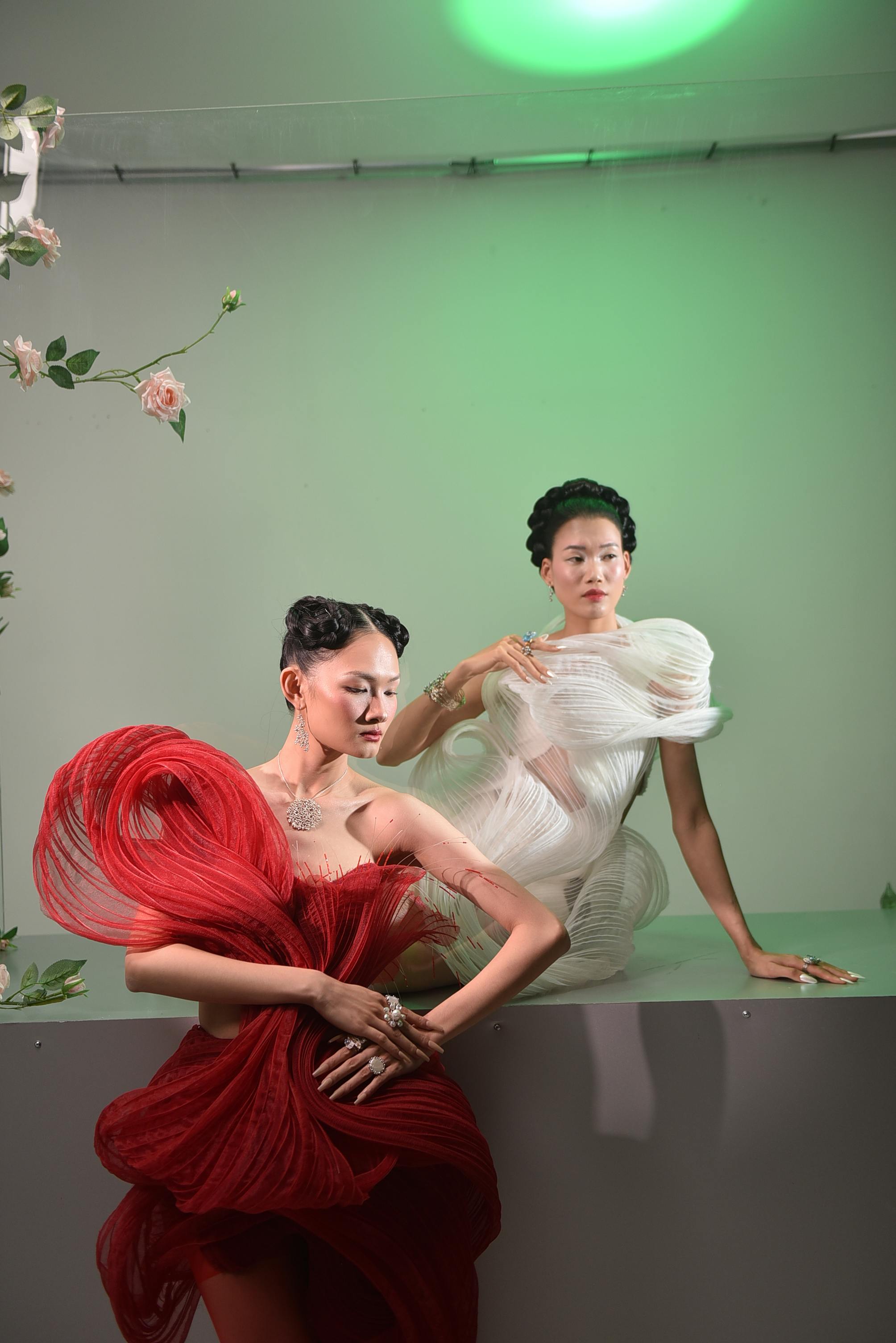 Elegant Fashion Models in Dramatic Couture Dresses · Free Stock Photo