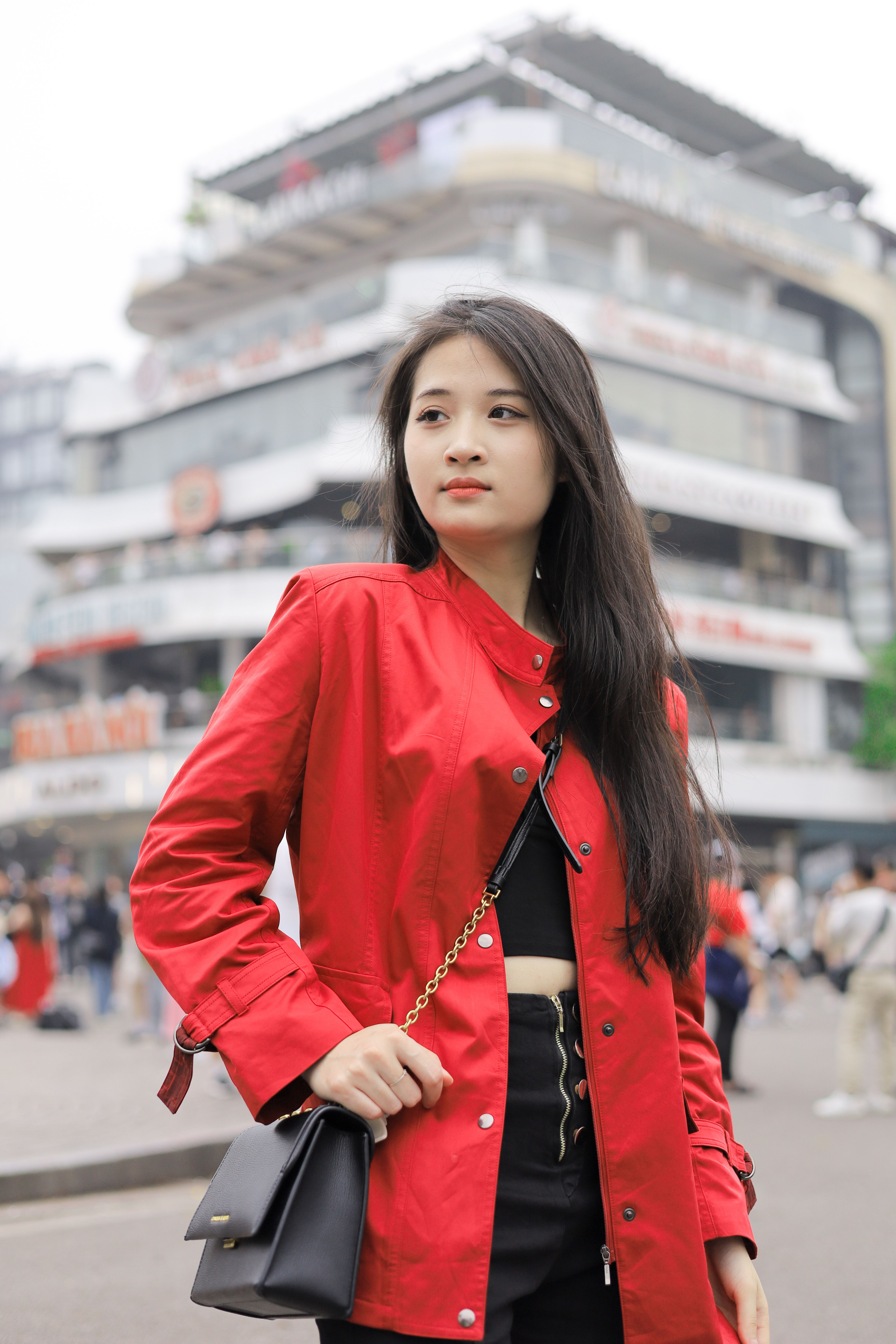 Stylish Woman in Red Jacket in Hanoi Street · Free Stock Photo