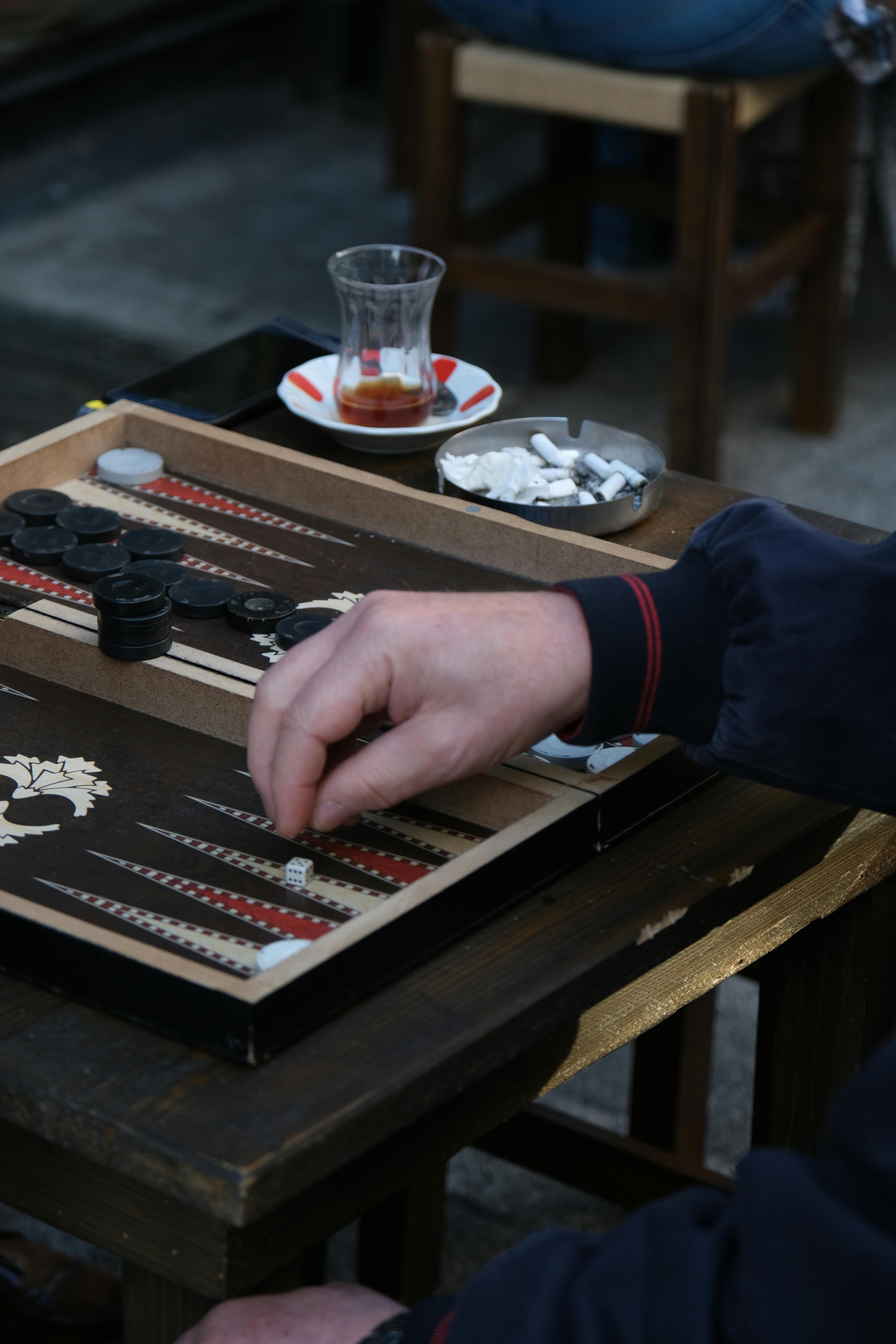 Backgammon Game with Tea on Outdoor Table · Free Stock Photo